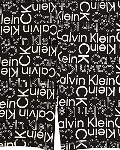 Calvin Klein Girls' Performance Bike Shorts, Soft & Stretchy with Flat Waistband & Snug Fit, Black Logo Toss, 12-14