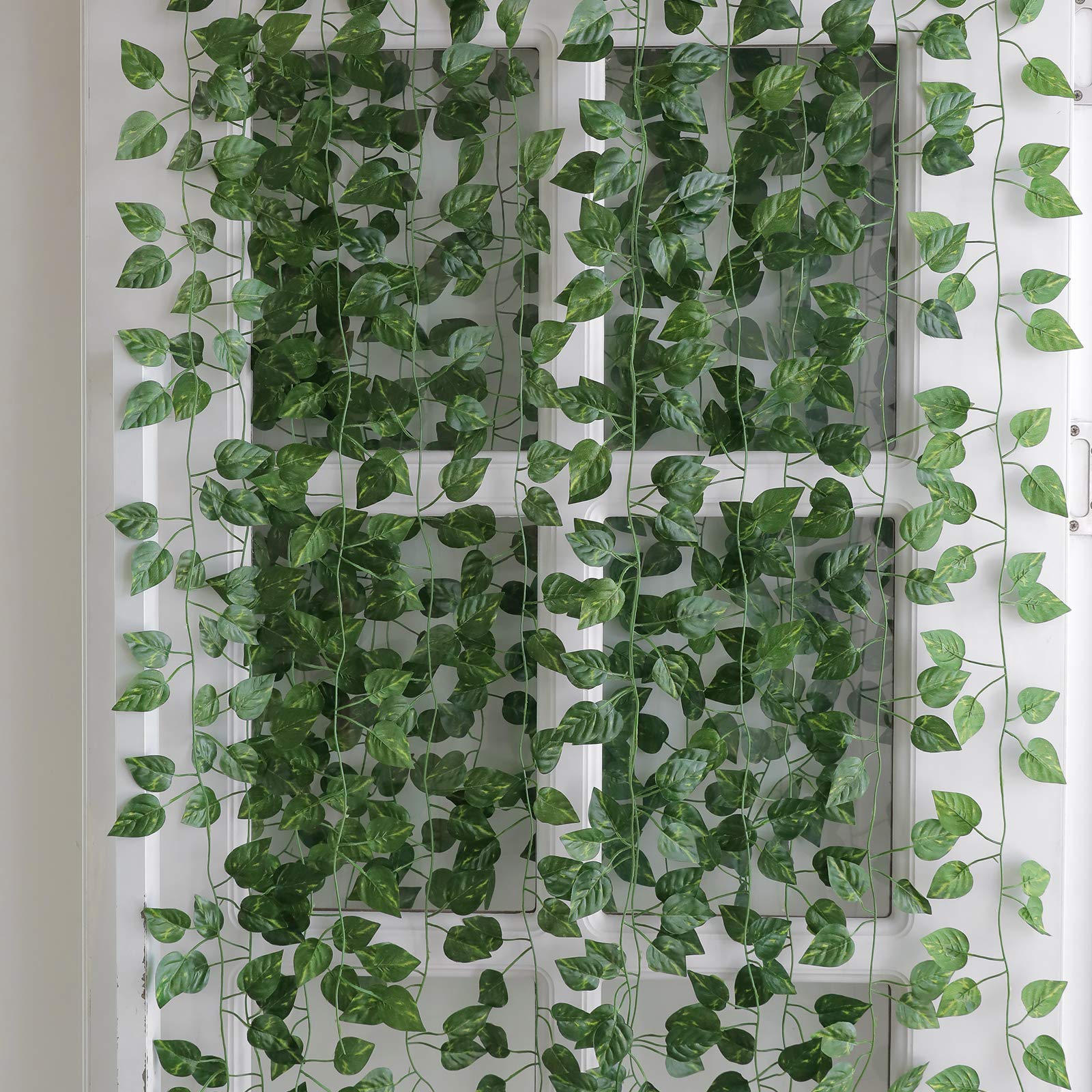 ZHIIHA 12 Strands 90.5 Ft Artificial Scindapsus Leaf Plants Vine Hanging Garland Fake Foliage Plants for Home Kitchen Garden Office Wedding Wall Decoration