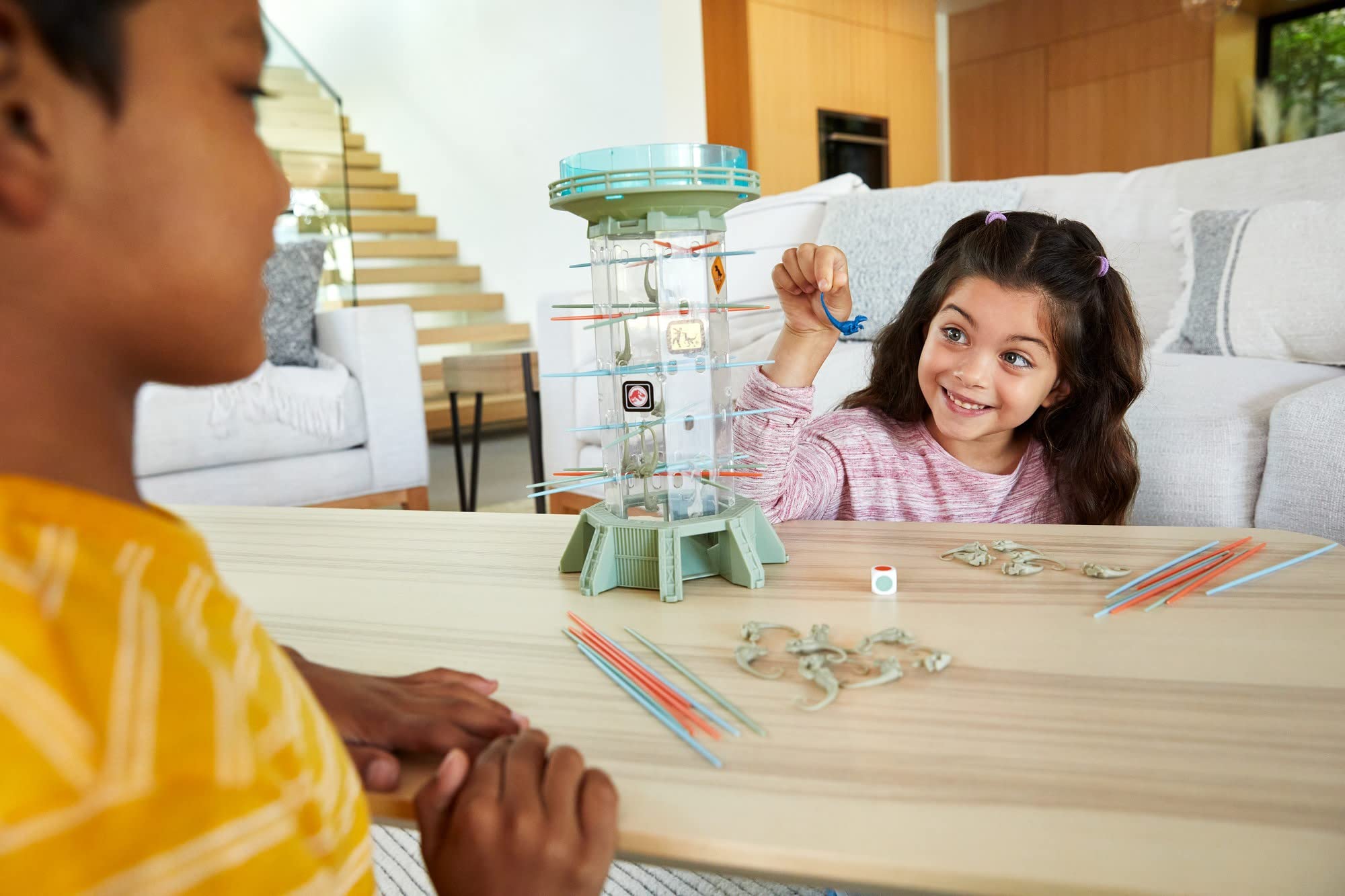 Mattel Games KerPlunk Jurassic World Dominion Kids & Family Game with Velociraptor Dinosaurs, Tower, Sticks, Die & Stickers