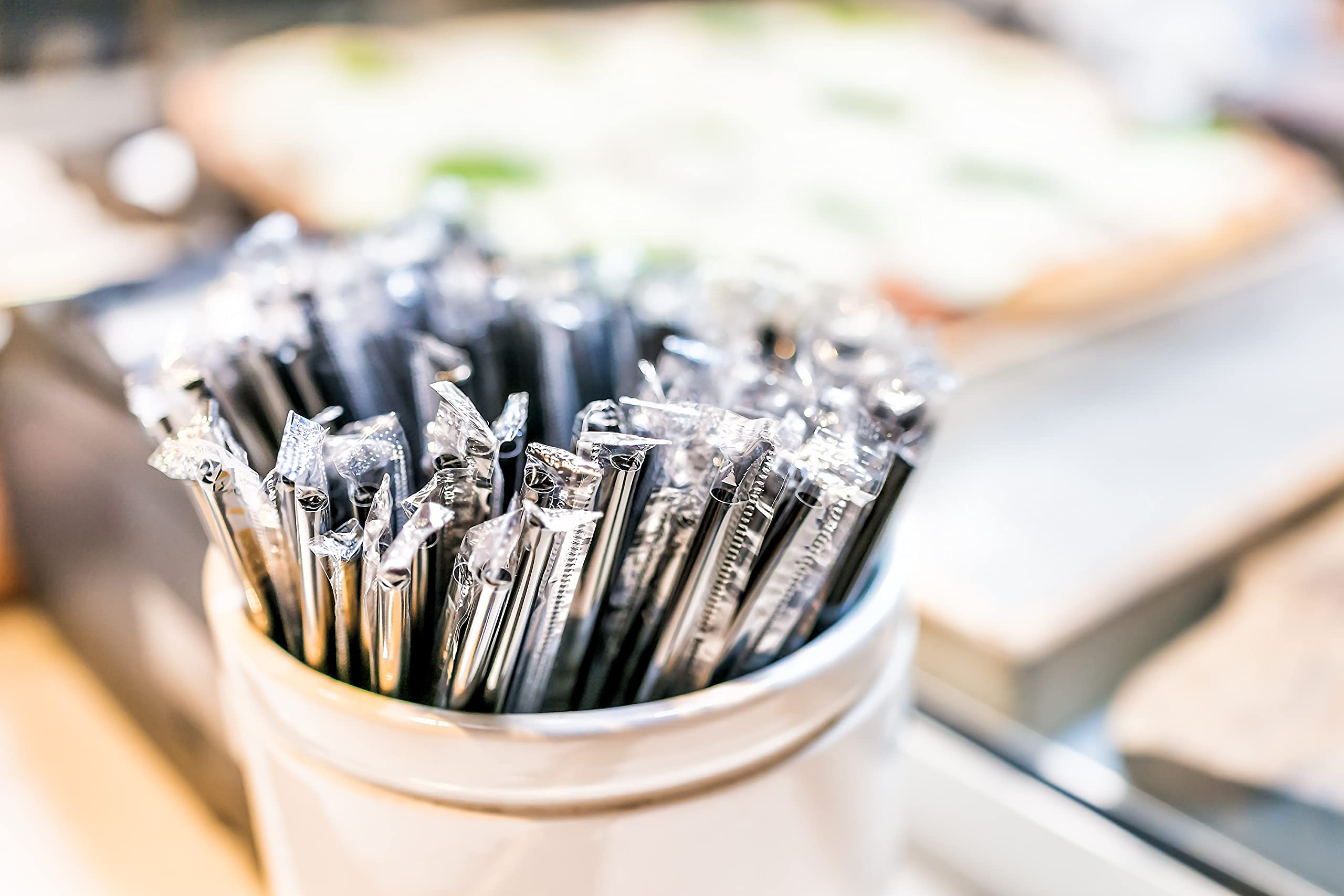 Concession Essentials Jumbo 7.75" Black Wrapped Standard Plastic. Pack of 1000 Count. Black - Wrapped Straws.