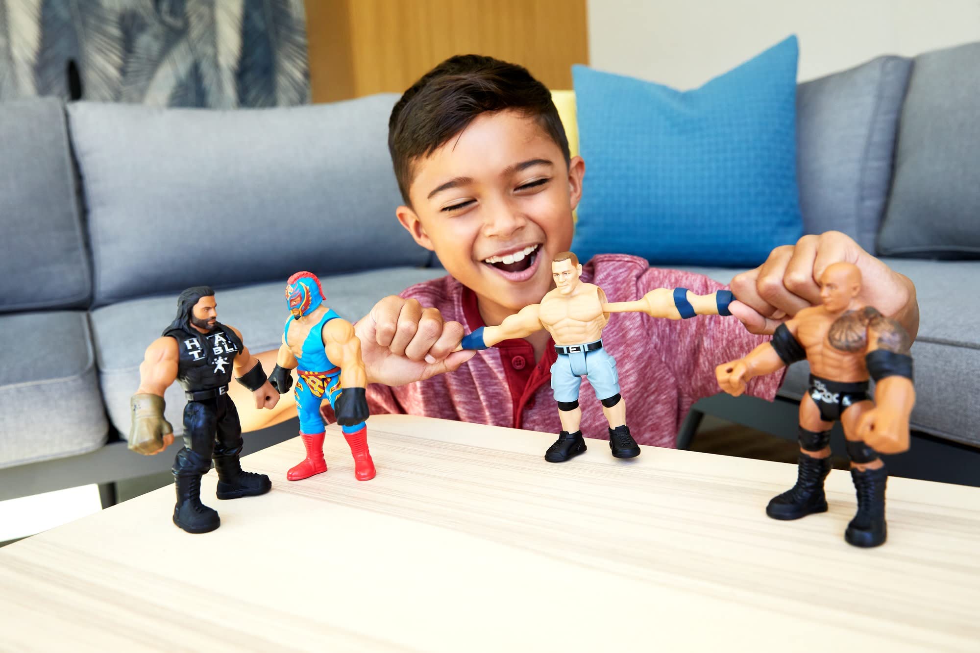 WWE Basic Action Figures, Posable 5.5-inch Collectible for Ages 6 Years Old & Up