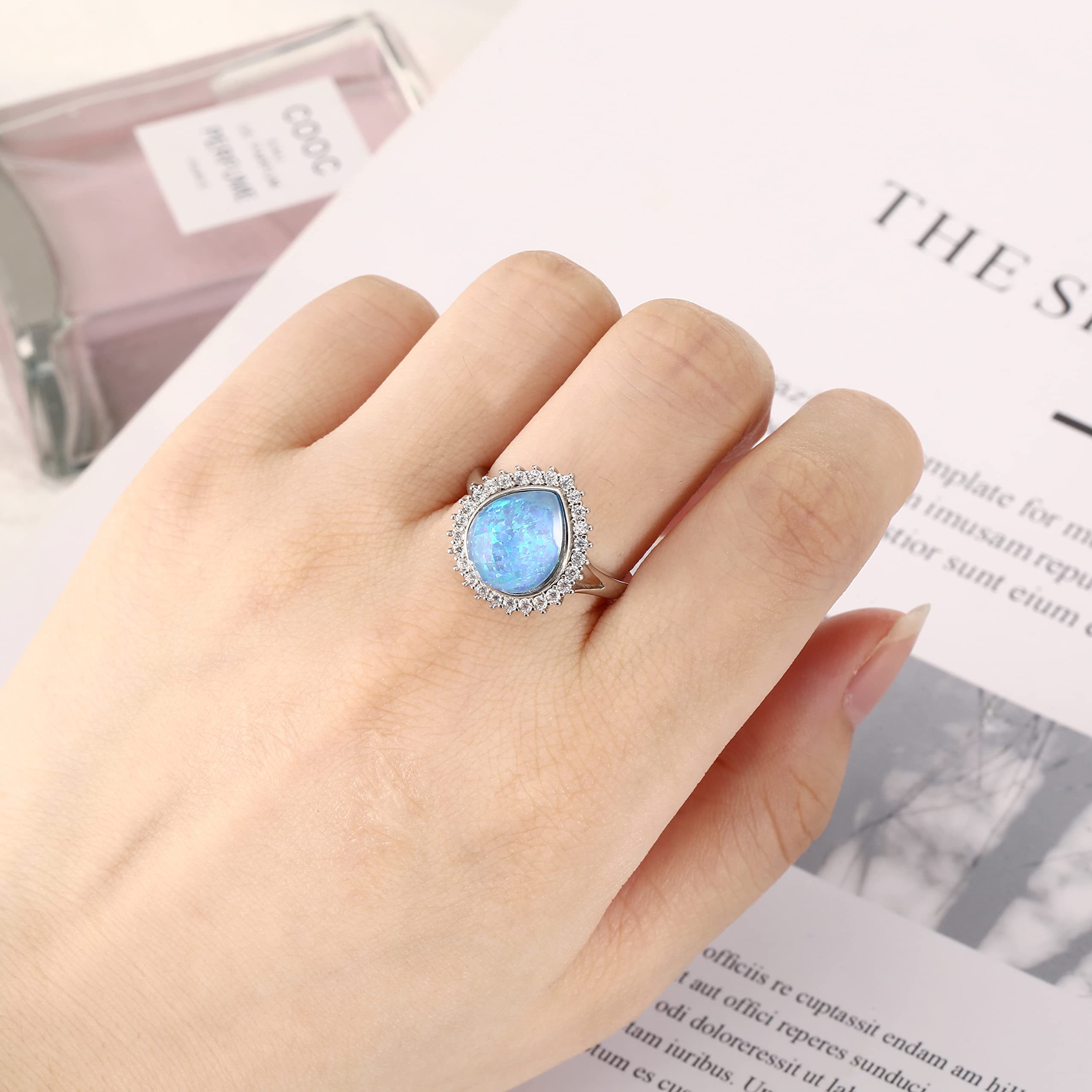 BONLAVIE 10X12mm Created Blue Opal Rings for Women 925 Sterling Silver Pear Shape Solid Opal Engagement Ring Paved Round Cut Cubic Zirconia October Birthstone Ring Promise Ring for Her Size 9