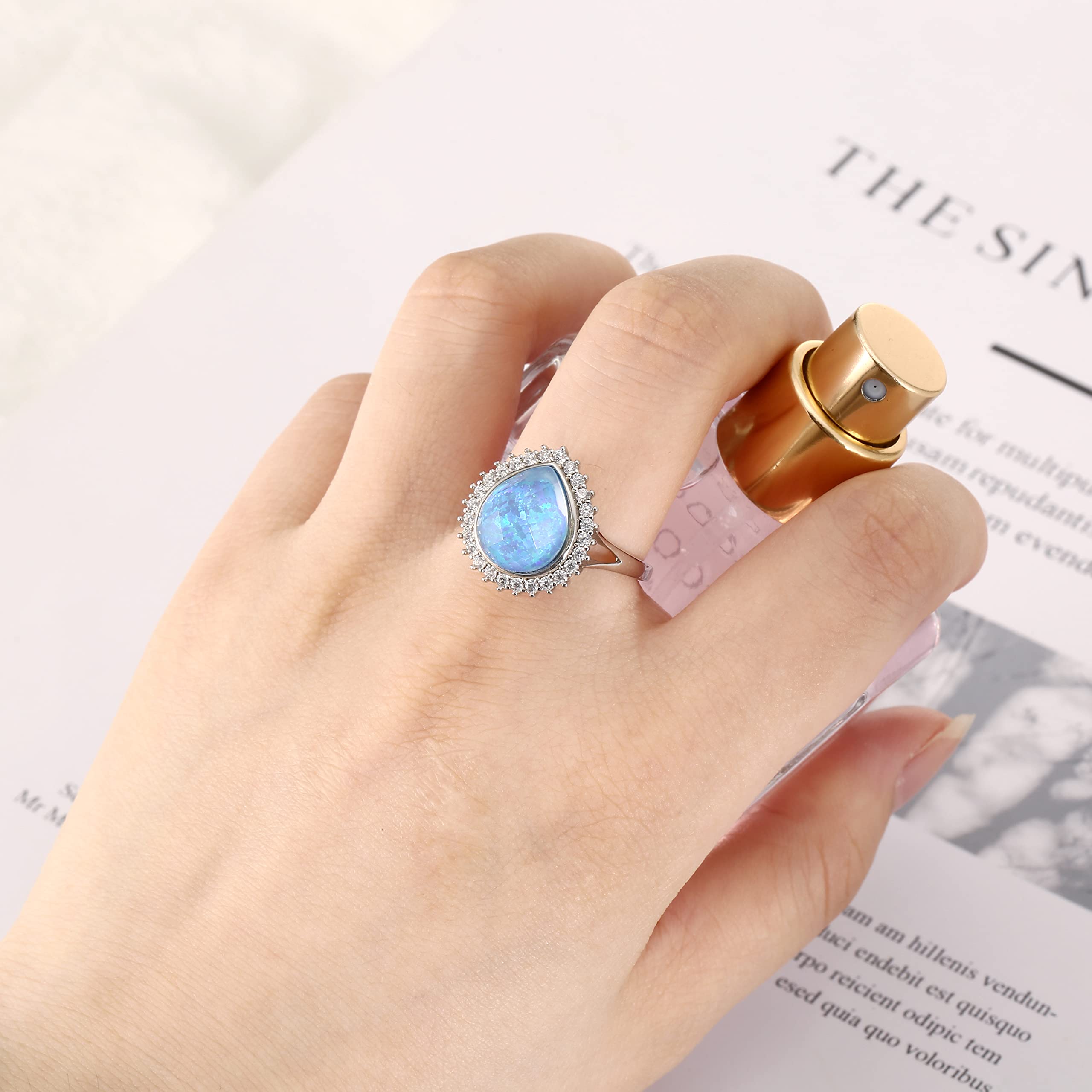 BONLAVIE 10X12mm Created Blue Opal Rings for Women 925 Sterling Silver Pear Shape Solid Opal Engagement Ring Paved Round Cut Cubic Zirconia October Birthstone Ring Promise Ring for Her Size 9