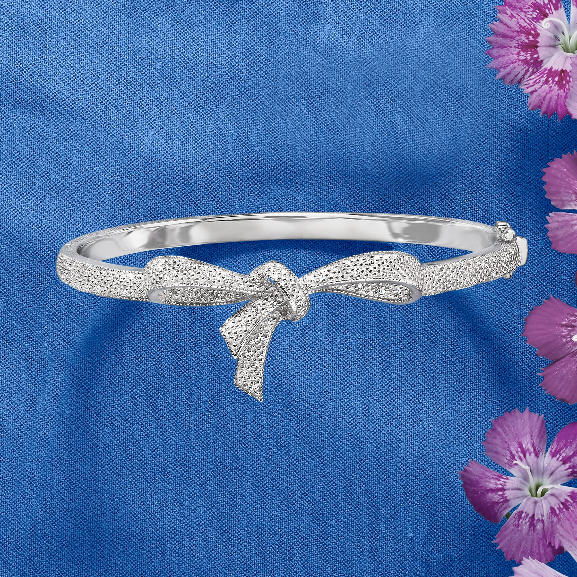 Ross-Simons 0.15 ct. t.w. Diamond Bow Bangle Bracelet in Sterling Silver. 7 inches