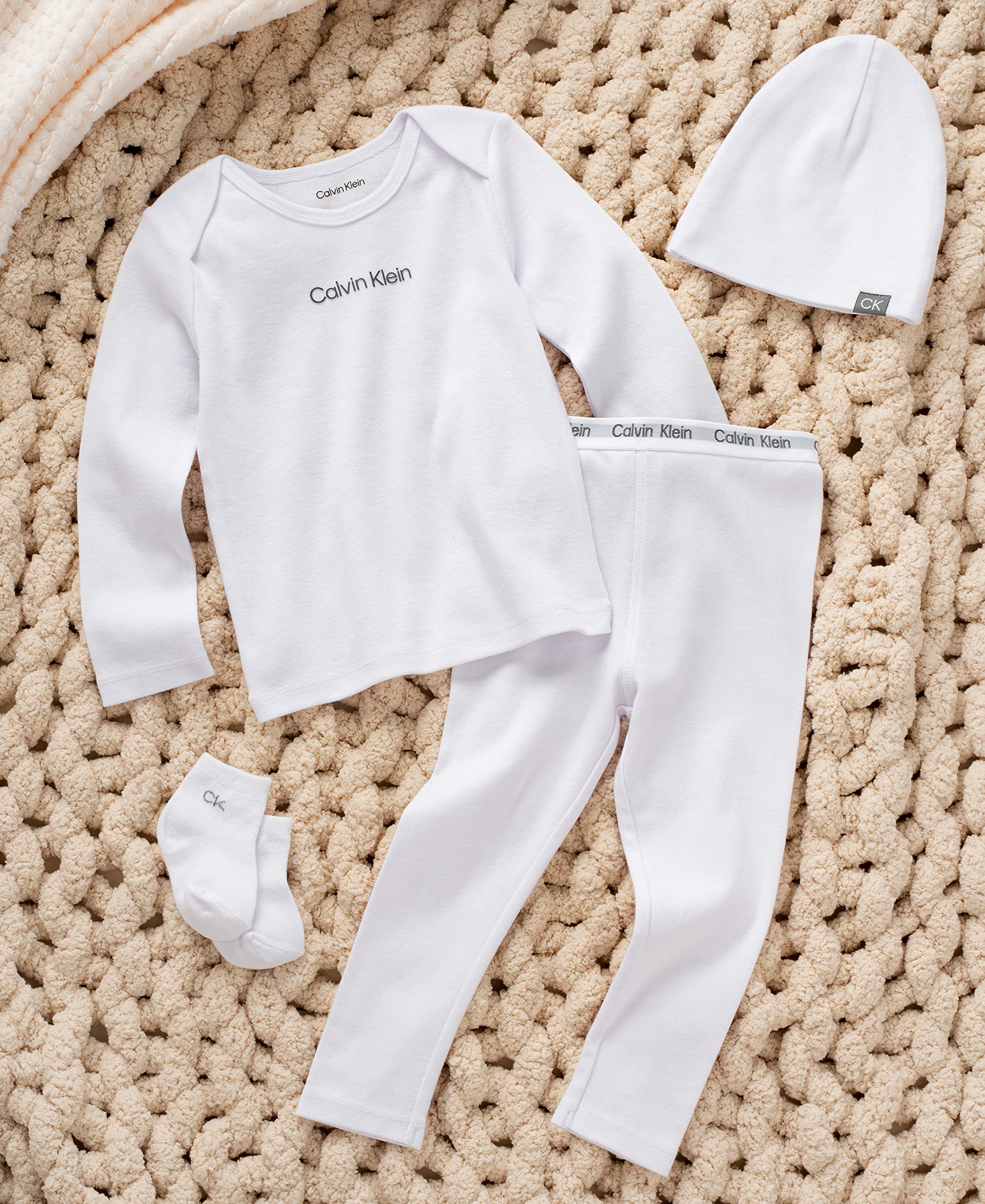 Calvin Klein Organic Unisex Baby Essentials 4-Piece Set with Long Sleeve Tee & Pants, Ultra-Soft Beanie & Socks Included, Bright White