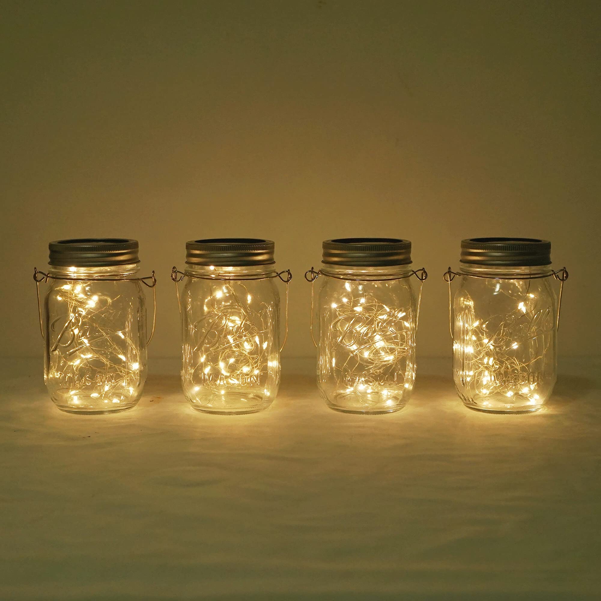 Decorman Solar Mason Jar Lights, 4 Pack 30 LED Fairy Star Firefly String Lids Lights with 4 Hangers for Patio Yard Garden Party Wedding Christmas Decoration(Jars Not Included) (4 Pack, Warm White)