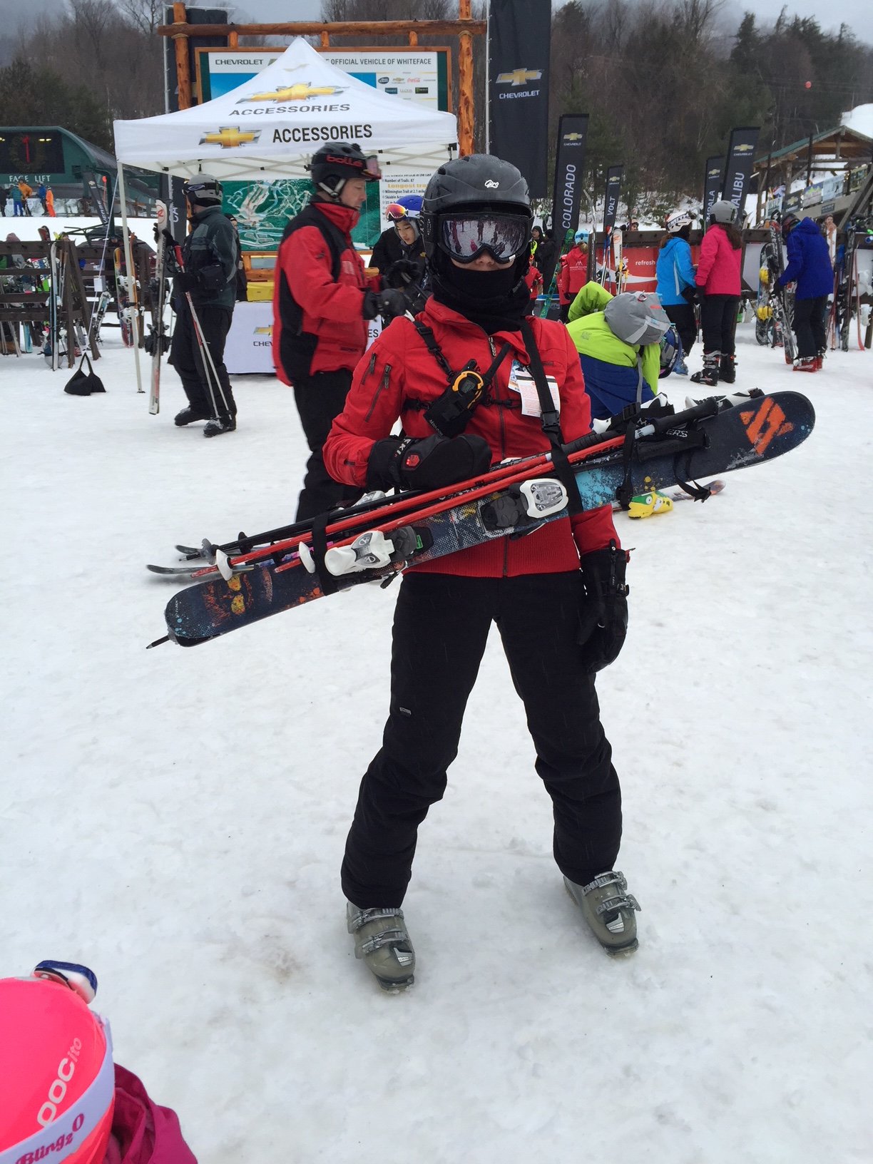 Carrier strap for single or multiple pairs of skis, poles, boots or snowboards