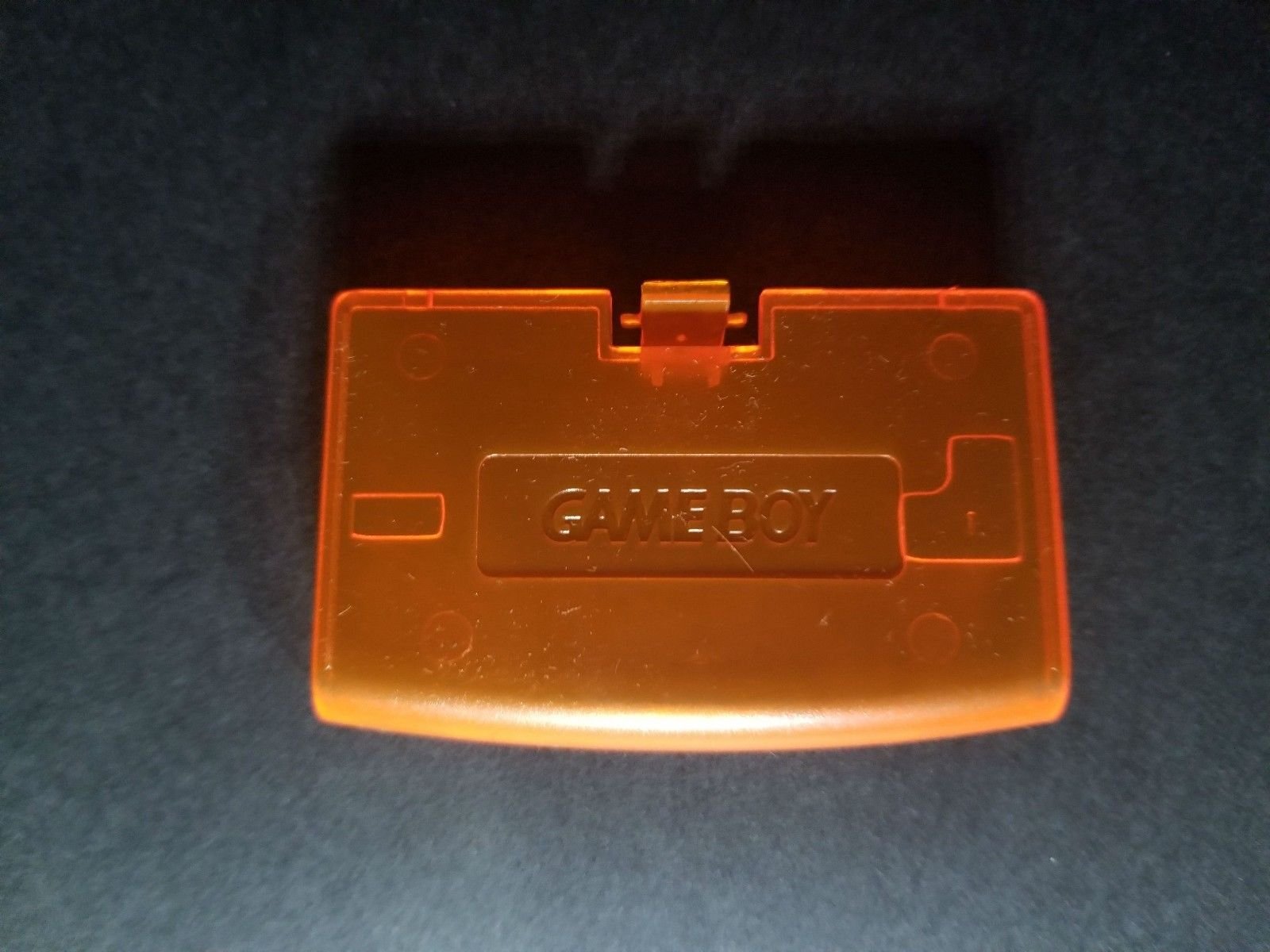TRANSPARENT ORANGE GAME BOY LOGO ADVANCE REPLACEMENT BATTERY COVER LID DOOR
