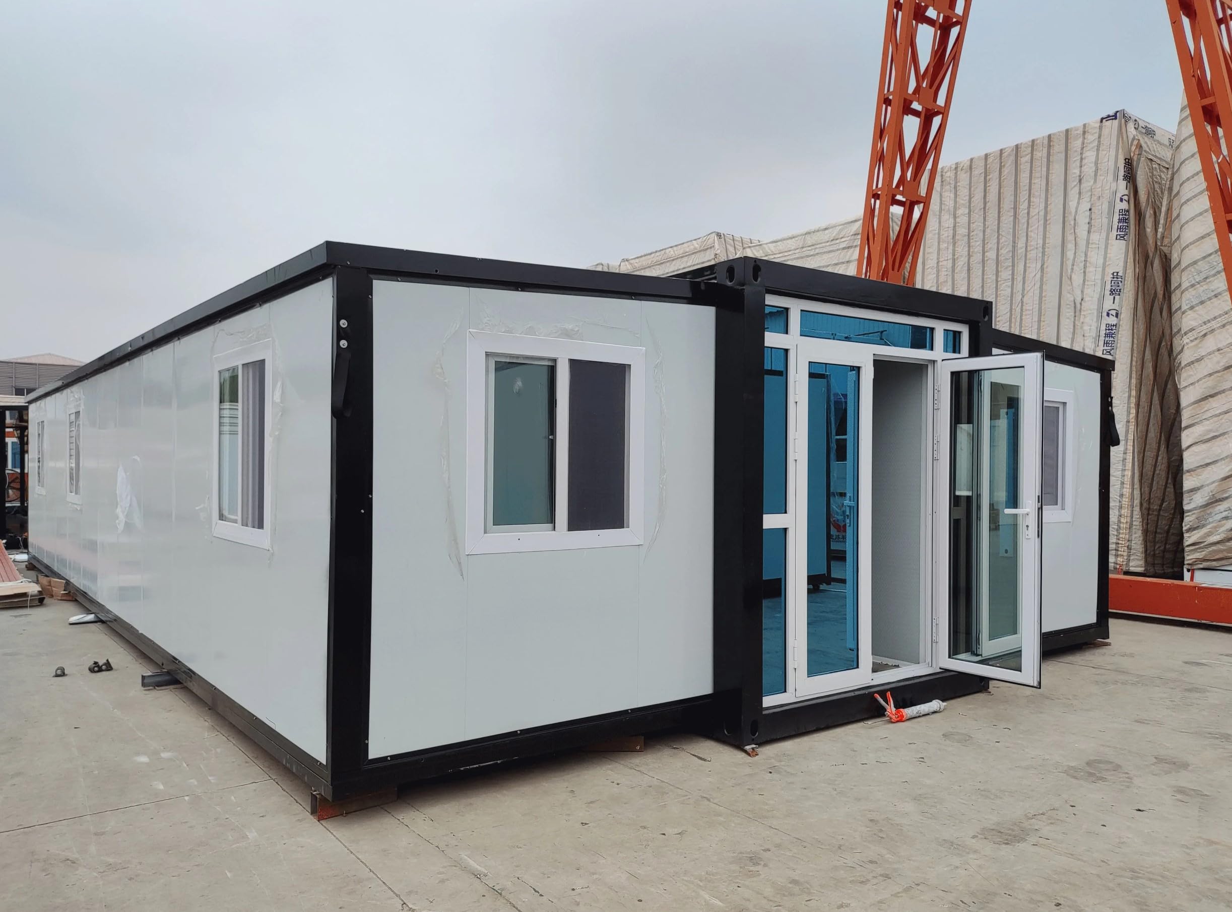 Generic Manufacturer 40FT Homes prefab Steel Expandable Container Houses Extendable Foldable Container House Including bedrooms, Kitchen, Bathroom and a Free TV