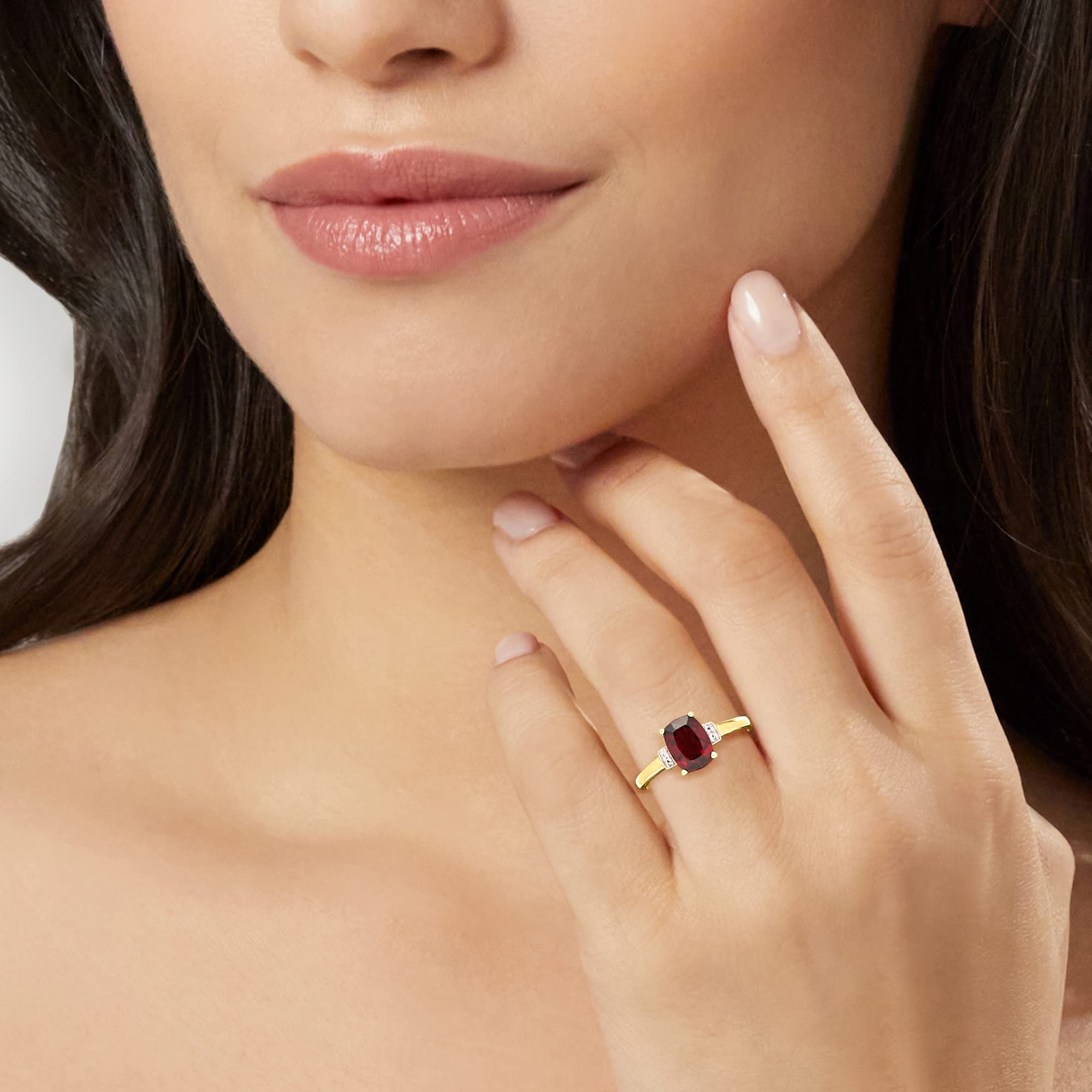 Canaria 1.80 Carat Garnet Ring With White Topaz Accents in 10kt Yellow Gold. Size 7