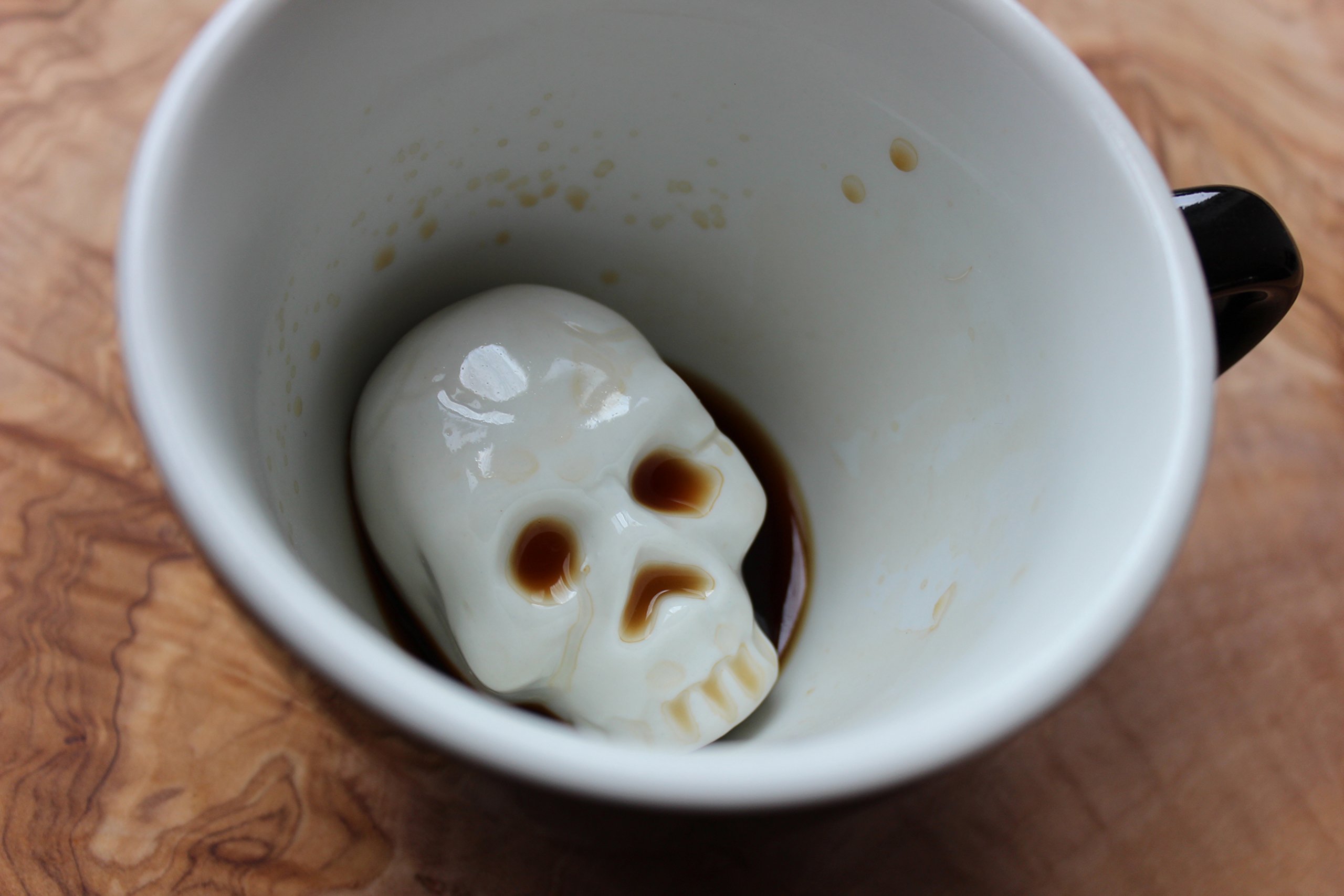 Creature Cups SKULL Ceramic Cup (11 Ounce, Black Exterior) | Hidden 3D Creature Inside Mug Emerges As You Drink | Spooky Creepy Coffee & Tea Cup