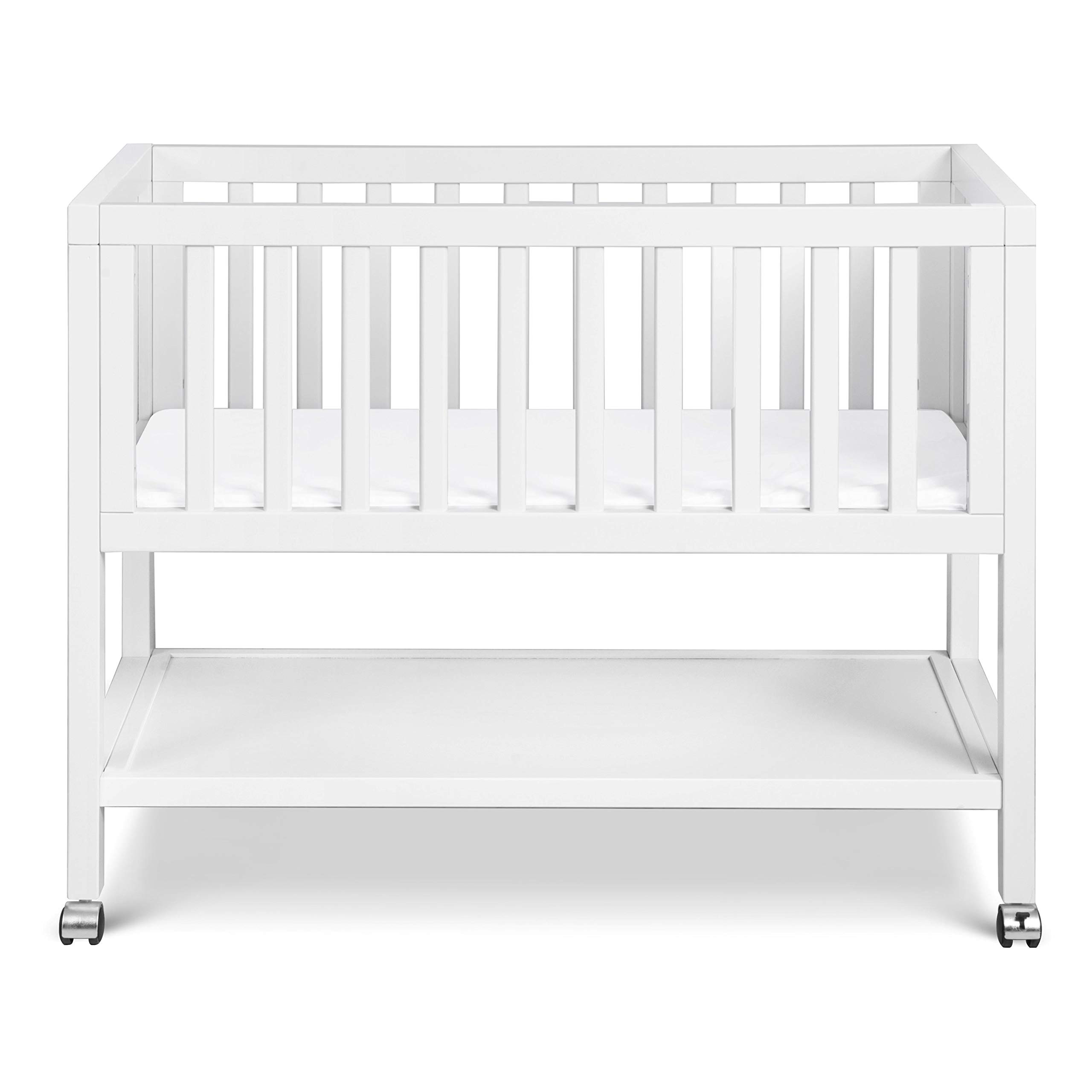 DaVinci Archie Portable Bassinet in White, Removeable Wheels, Greenguard Gold Certified