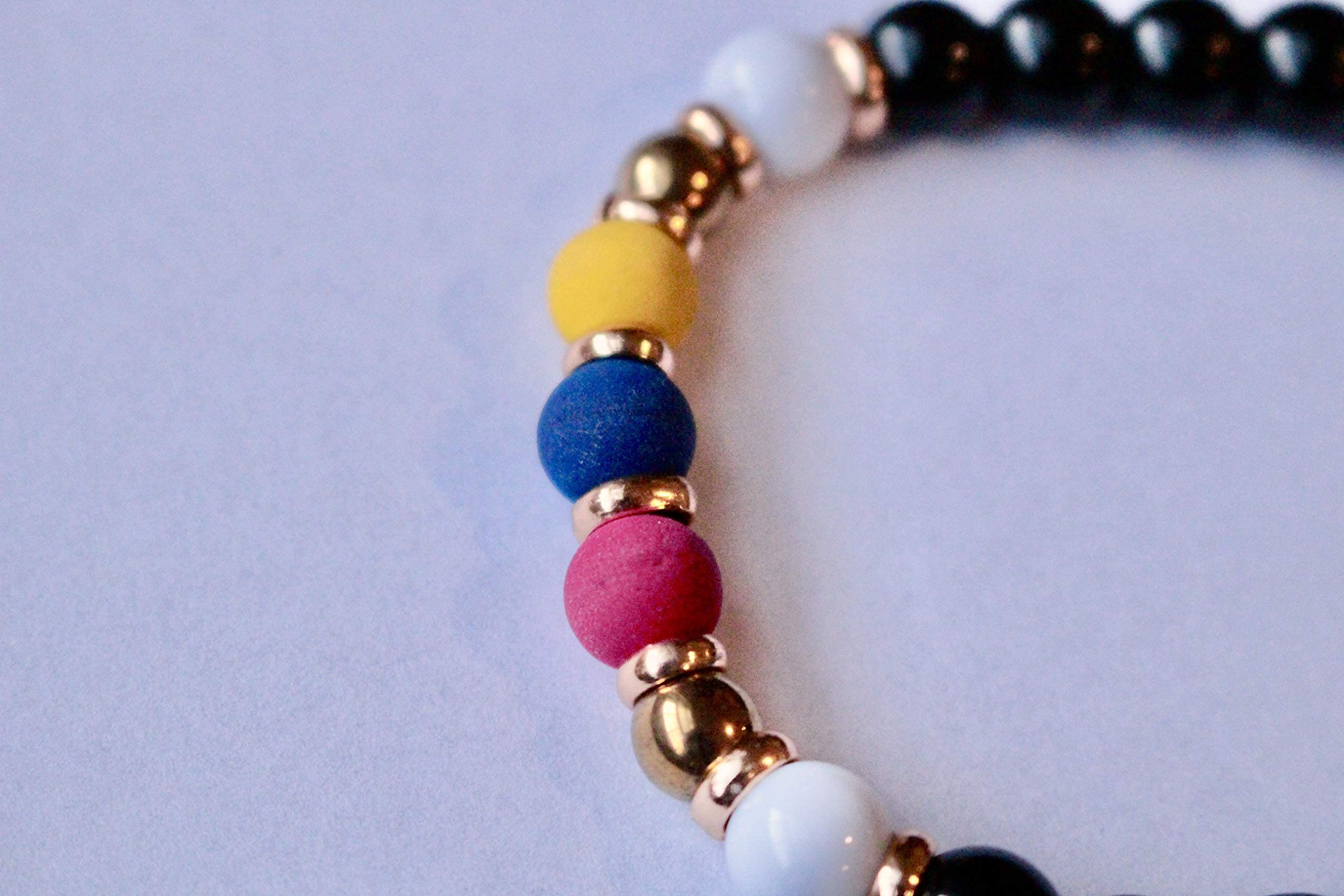CharmsOfTheWorld Handmade Bracelet from Medellin - Colombia Flag Colors - Cat's eye gemstone and steel beads - Sliding Knot