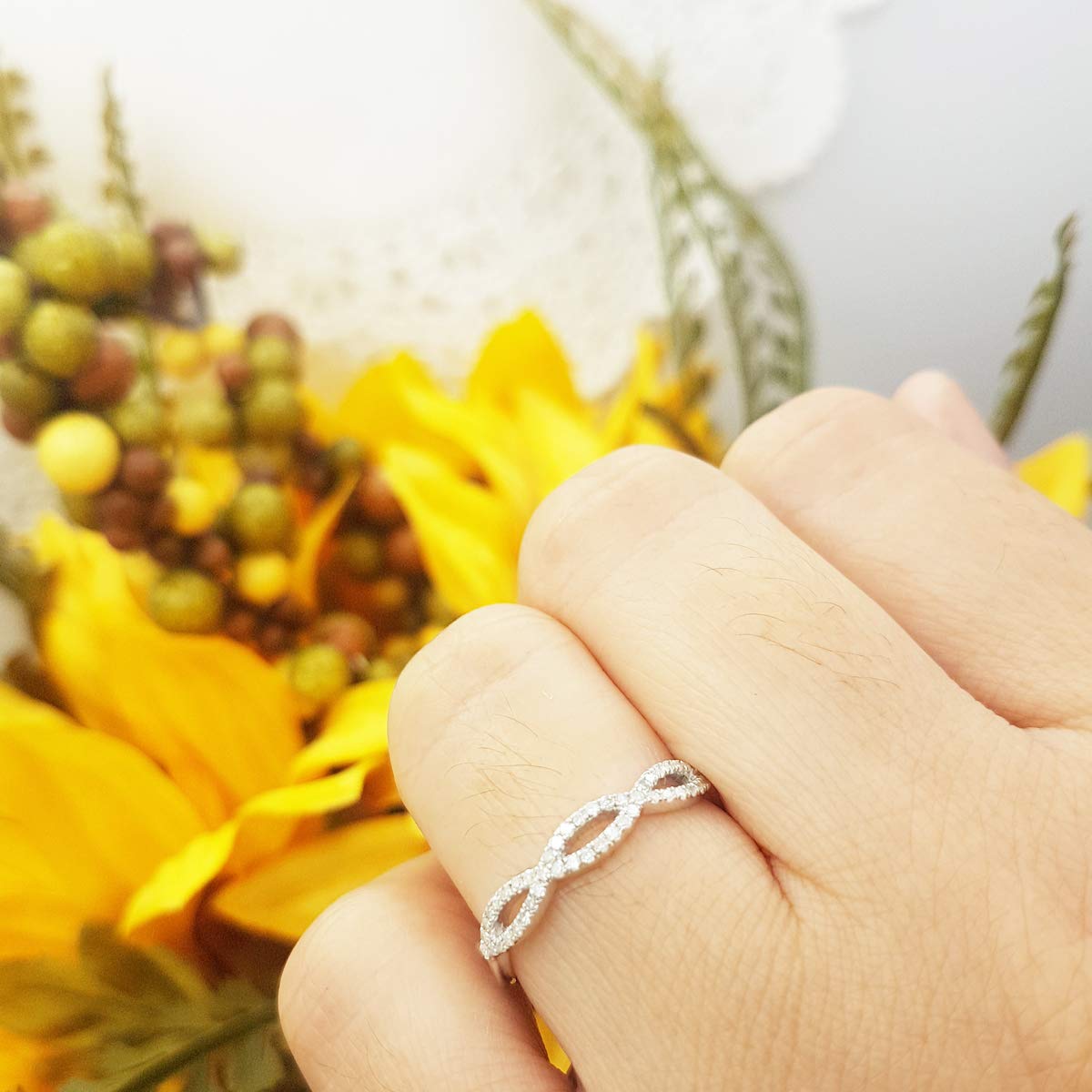 Dazzlingrock Collection 0.25 Carat (Cttw) 925 Sterling Silver Round Diamond Women Infinity Swirl Wedding Band 1/4 CT, Size 6.5