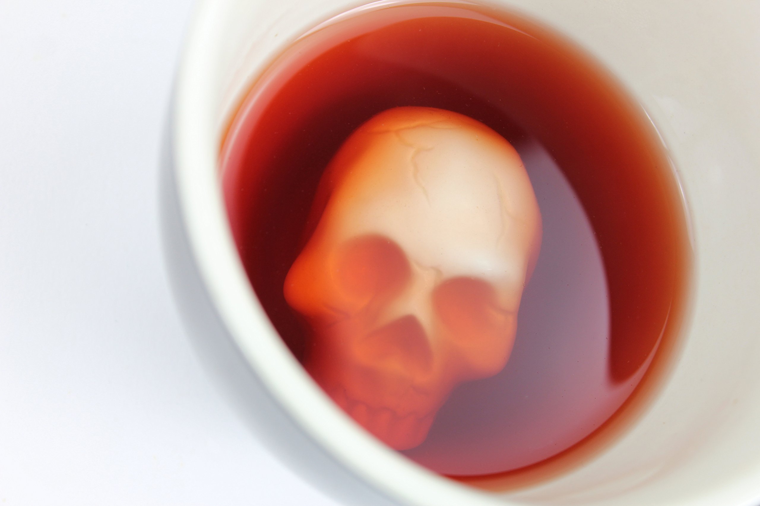 Creature Cups SKULL Ceramic Cup (11 Ounce, Black Exterior) | Hidden 3D Creature Inside Mug Emerges As You Drink | Spooky Creepy Coffee & Tea Cup