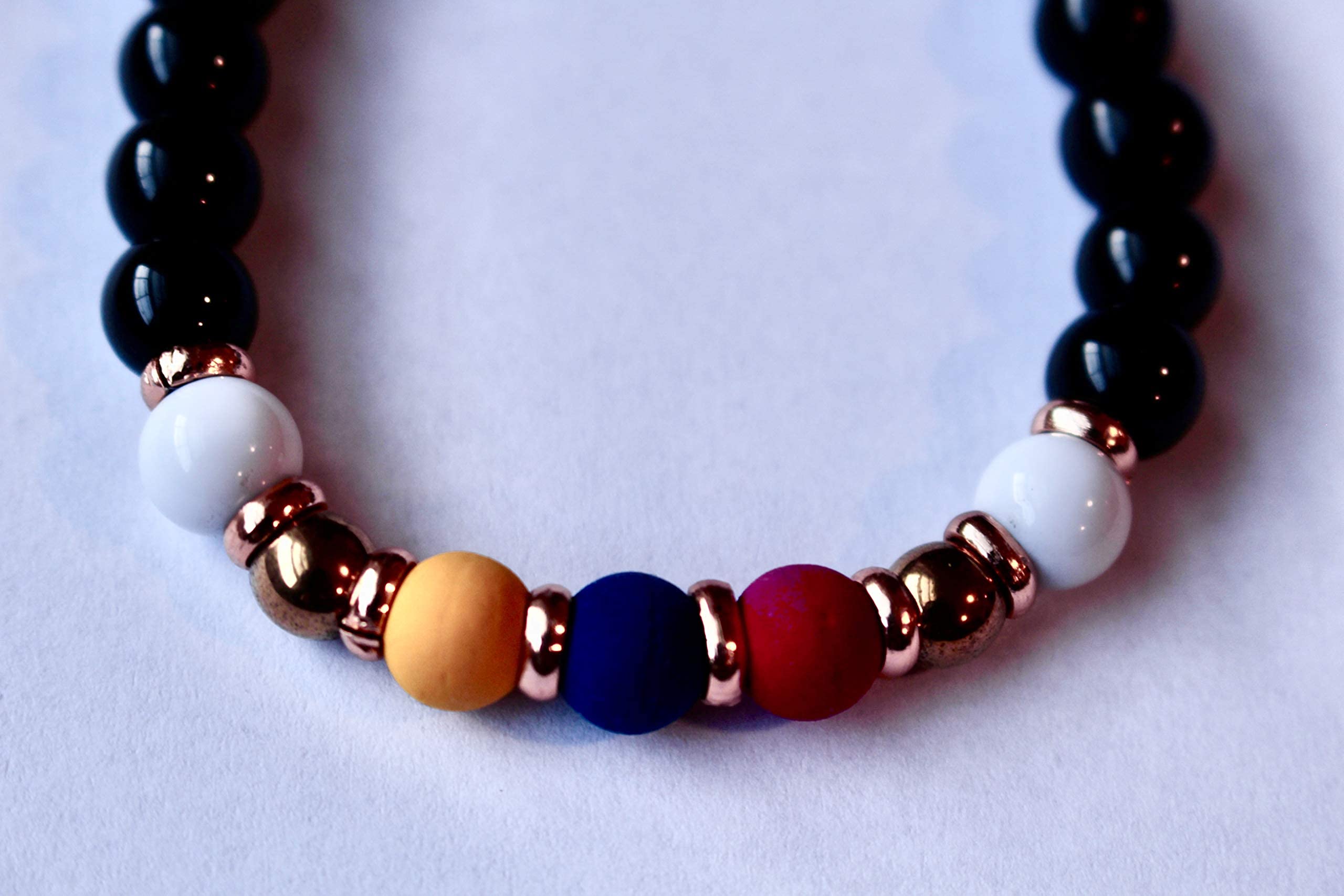 CharmsOfTheWorld Handmade Bracelet from Medellin - Colombia Flag Colors - Cat's eye gemstone and steel beads - Sliding Knot