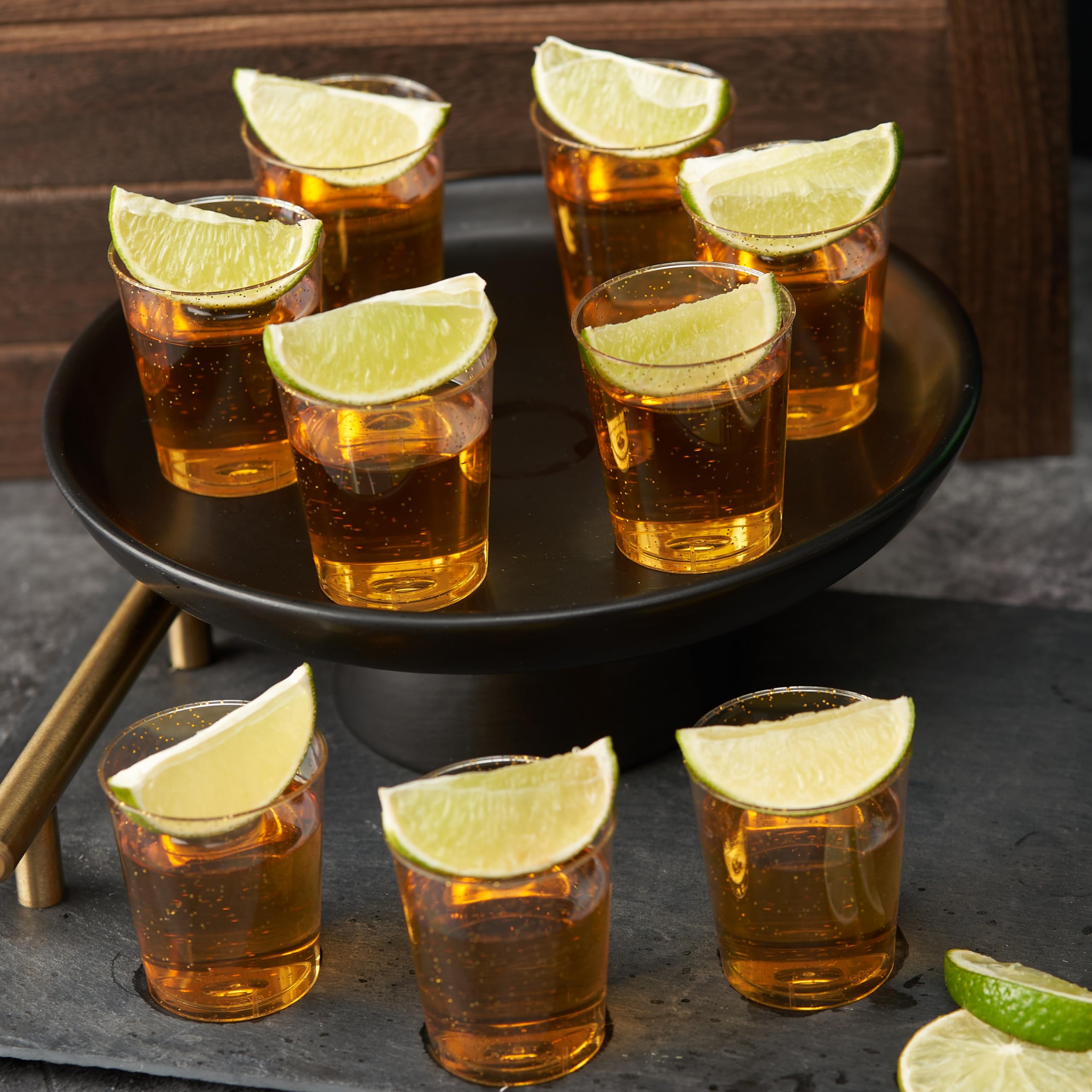 MATANA 100 Pack Clear Plastic Shot Glasses Gold Glitter 2 Oz - Sturdy & Reusable - Jello & Tequila Shots, Sample Tasting Cups - Birthdays, Weddings, Christmas, BBQ, Parties