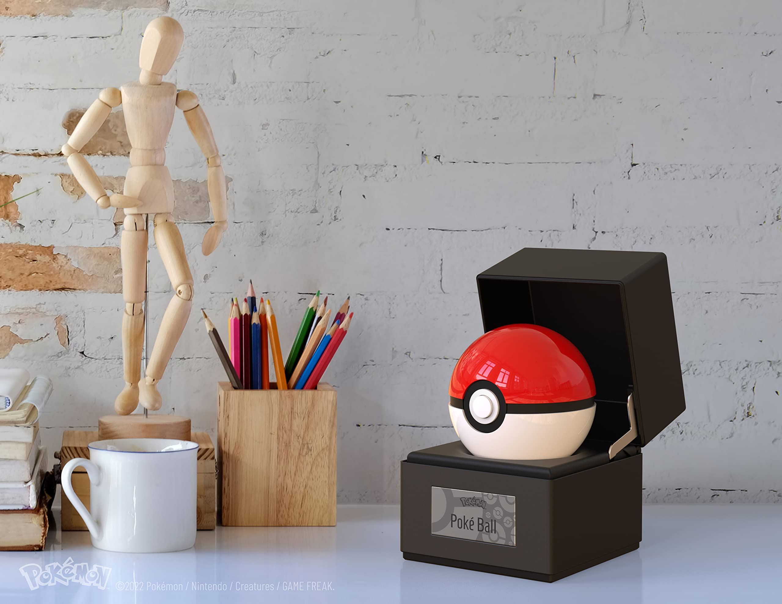 The Wand Company Pokémon Poké Ball Authentic Replicas - Realistic, Electronic, Die-Cast Poké Ball with Display Case Light Features (Original Poké Ball)