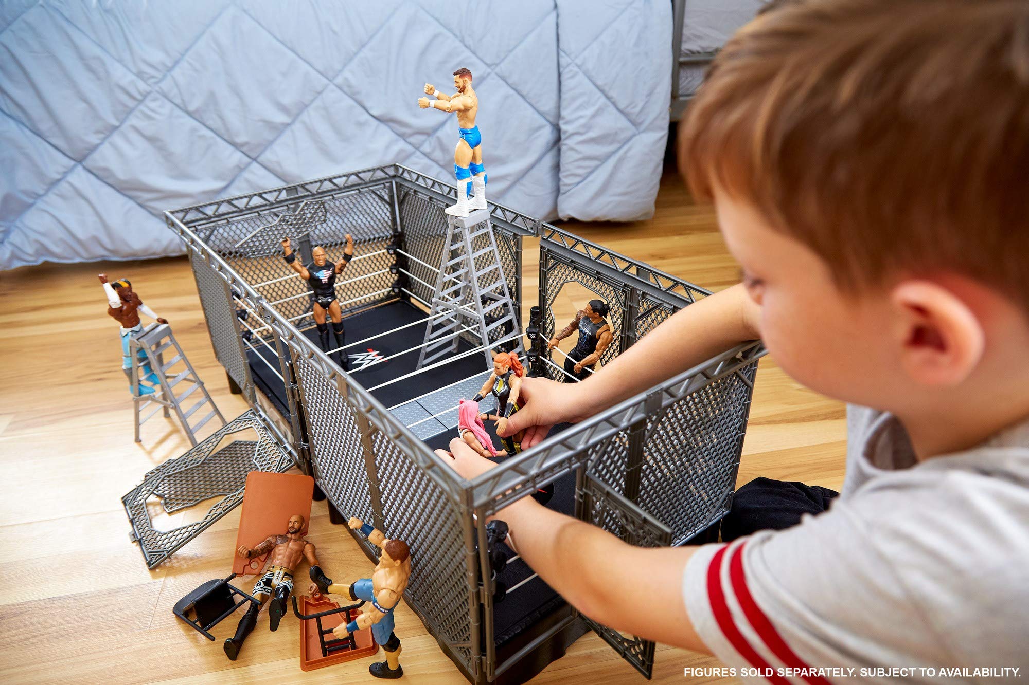 WWE MATTEL NXT Takeover War Games Playset with 2 NXT Rings, 2 Connecting Cages with Breakaway Pieces, 2 Ladders, Chair, Table & More; for Ages 6 Years