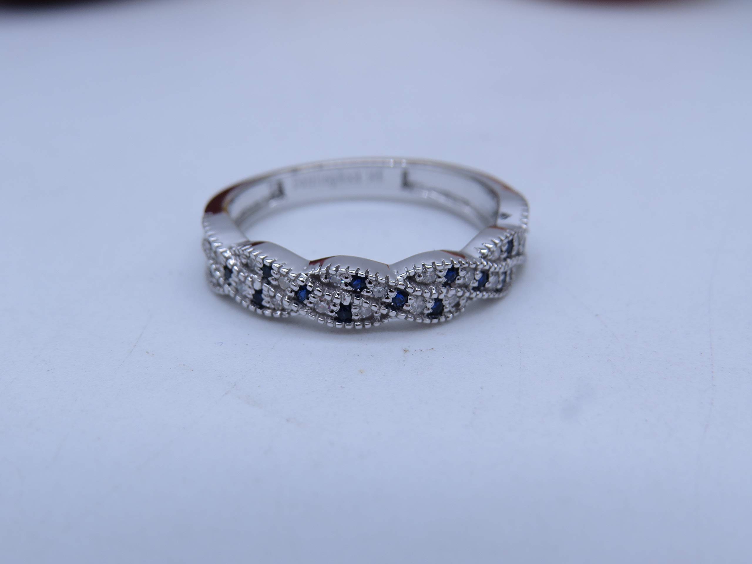 Dazzlingrock Collection 10K Round White Diamond & Blue Sapphire Women Anniversary Wedding Band Swirl Ring, White Gold, Size 7