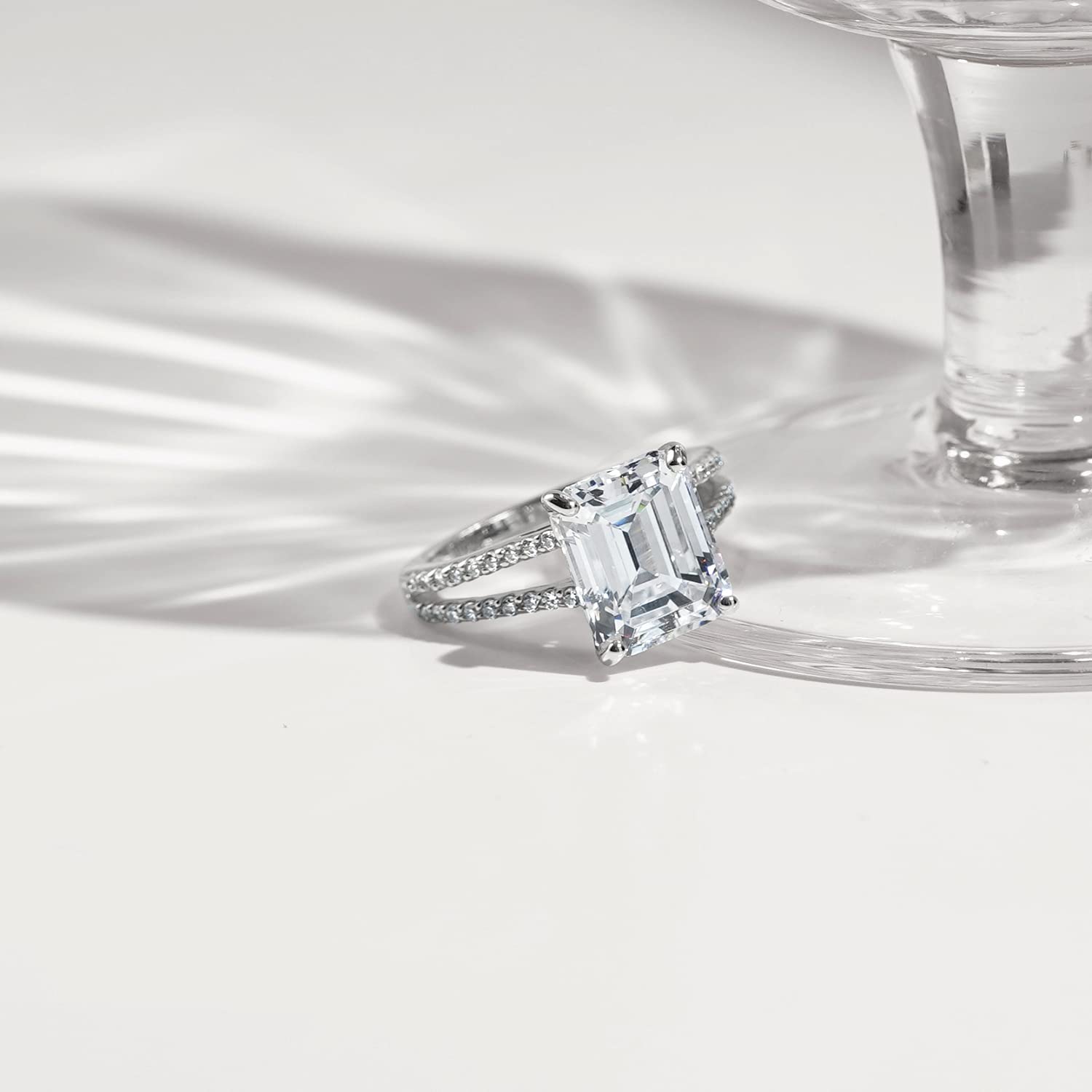 DIAMONBLISS Platinum Plated Sterling Silver 5.55 Ct Emerald cut Cubic Zirconia Cocktail Ring (9)