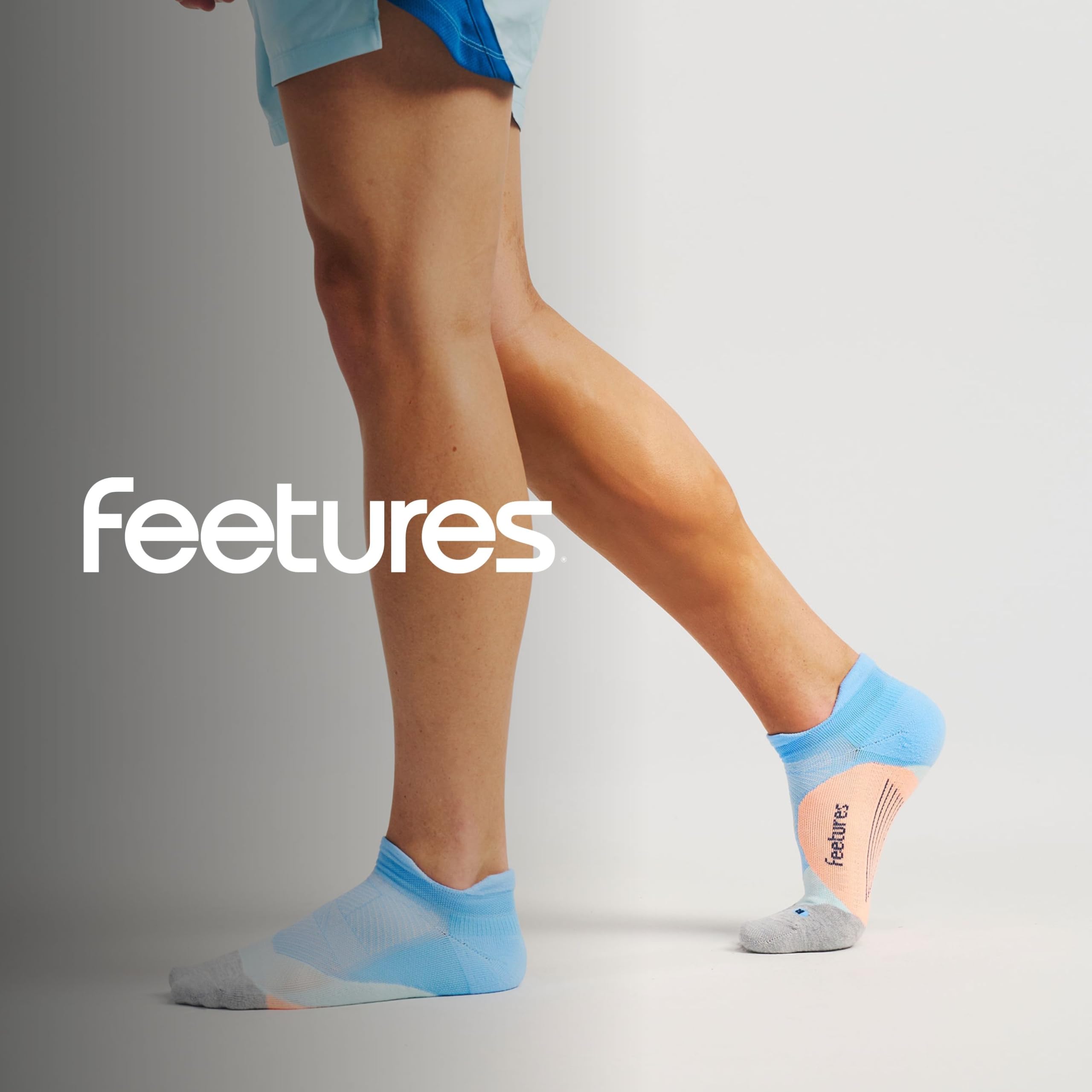 Feetures Elite Light Cushion No Show Tab Ankle Socks - Sport Sock with Targeted Compression - Bust Out Black, M (1 Pair)