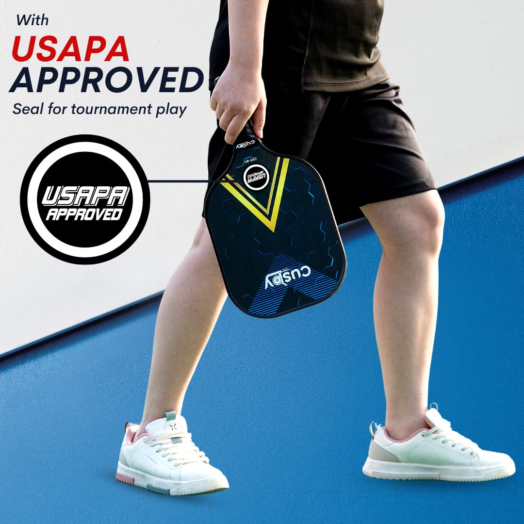 Cuspy USAPA Pickleball Paddles Set of 2 – includes 2 Pickleball Paddles with sturdy Graphite Surface and trendy Dark Blue color, 4 Balls, 2 Extra Grip Tapes, 2 Wristbands, and a durable Pickleball Bag
