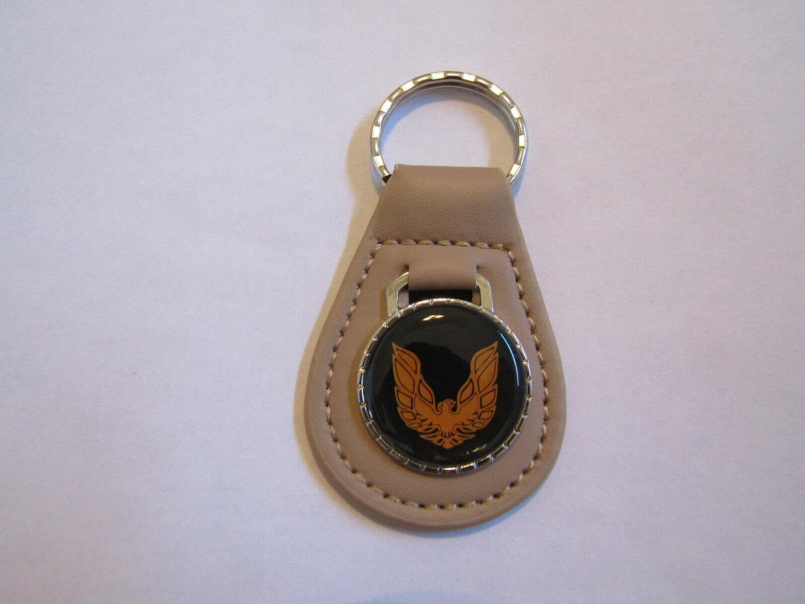 FIREBIRD OR TRANS-AM ORANGE BIRD LOGO LEATHER KEYCHAIN - BEIGE