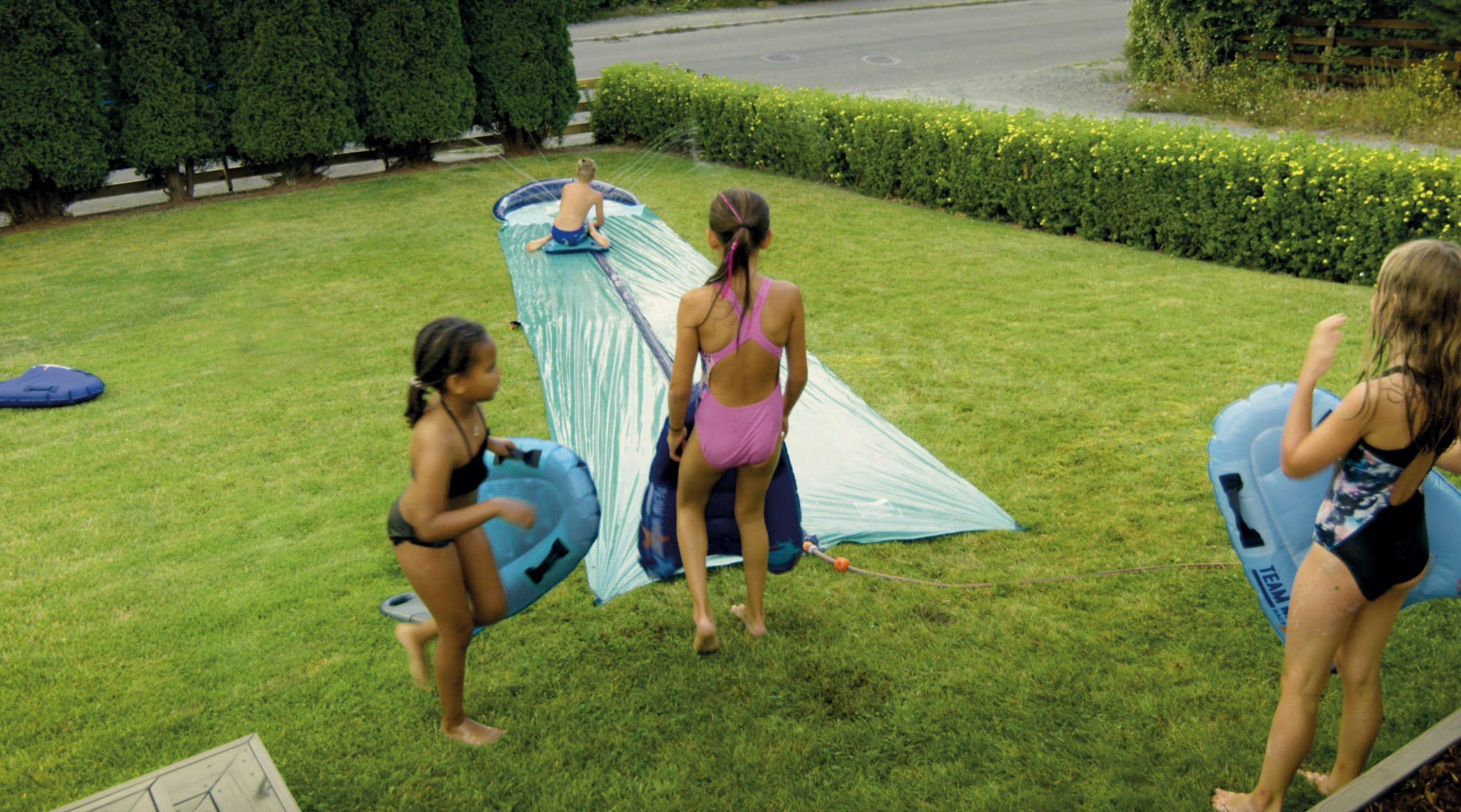 TEAM MAGNUS 31ft Slip and Slide Water Slide with Inflatable Crash Pad, Adjustable Sprinkler for Kids β Slip and Slide for Adults & Kids, Perfect for Backyard Fun