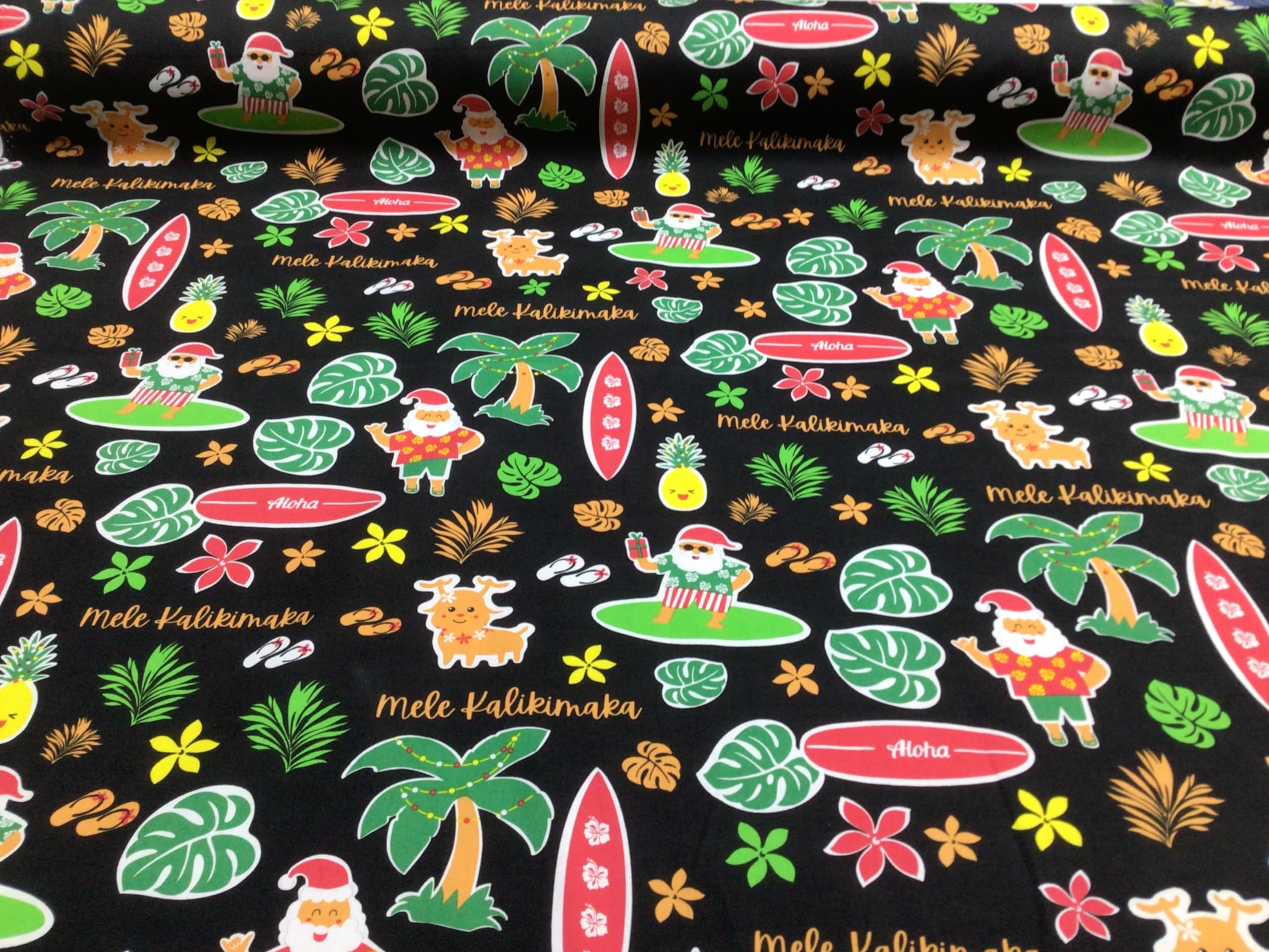 Mele Kalikimaka Hawaiian Christmas Surfing Santa in Black Background Hawaiian Print 100% Cotton Fabric Sold by The Yard