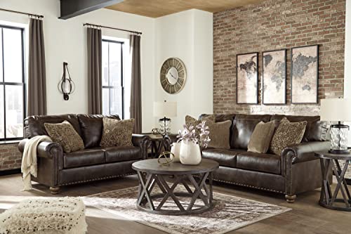 Signature Design by Ashley Nicorvo Traditional Faux Leather Sofa with Gold Nailhead Trim, Brown