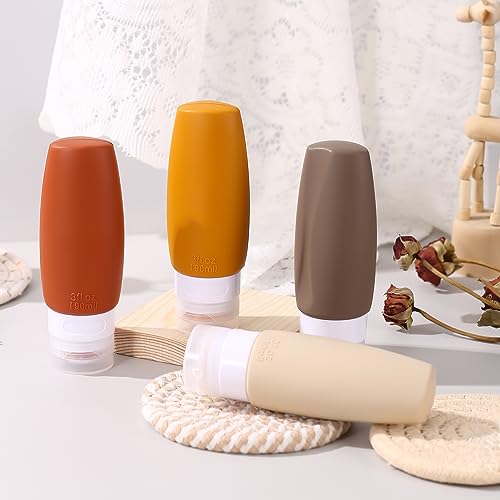 LIYUABU Silicone Travel Bottles for Toiletries,Tsa Approved 3oz 4Pack Portable Refillable Travel Bottles,Leak Proof BPA Free Squeezable Travel Size Containers Accessories with Toiletry Bag(Brown)