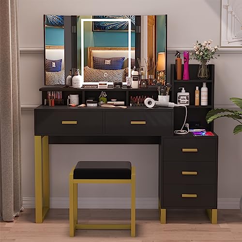 PAKASEPT Makeup Vanity with Tri-fold Makeup Mirror, Vanity Desk with 3-Color Adjustable Touch Light, Charging Station, Vanity Table with Nightstand,5 Drawers, Storage Shelves&Cushioned Stool…
