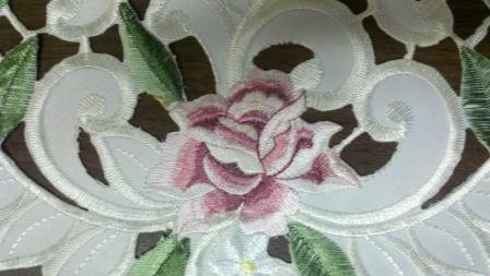 Doily Boutique Place Mat or Doily with a Light Pink Cutwork Rose, Size 11 x 17 inches