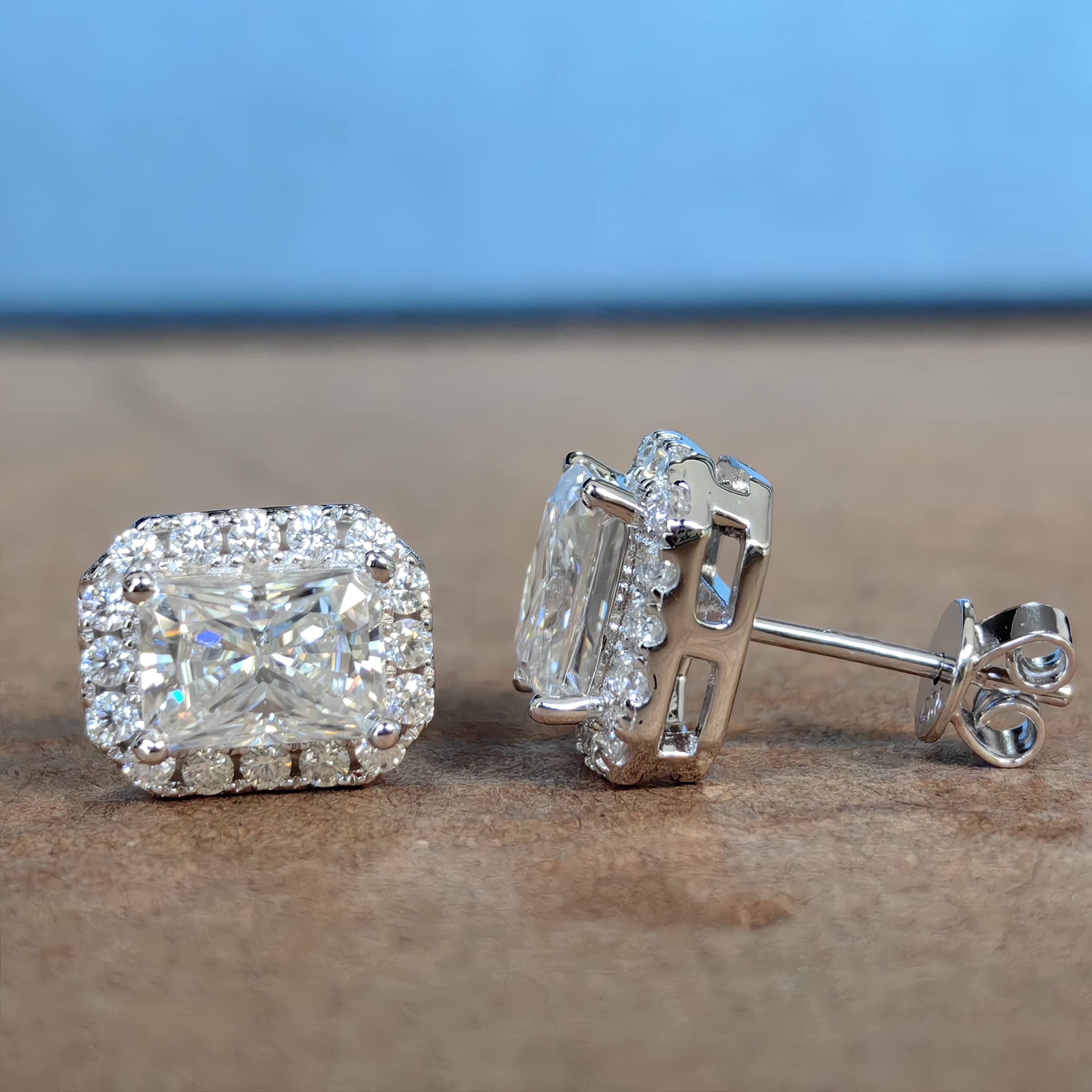 DovEggs Moissanite Stud Earrings for Women Solid 10K White Gold Post 2ct Center 5X7mm GHI Color Elongated Radiant Cut Moissanite Halo Stud Earring Accents Push Back Sterling Silver Earrings