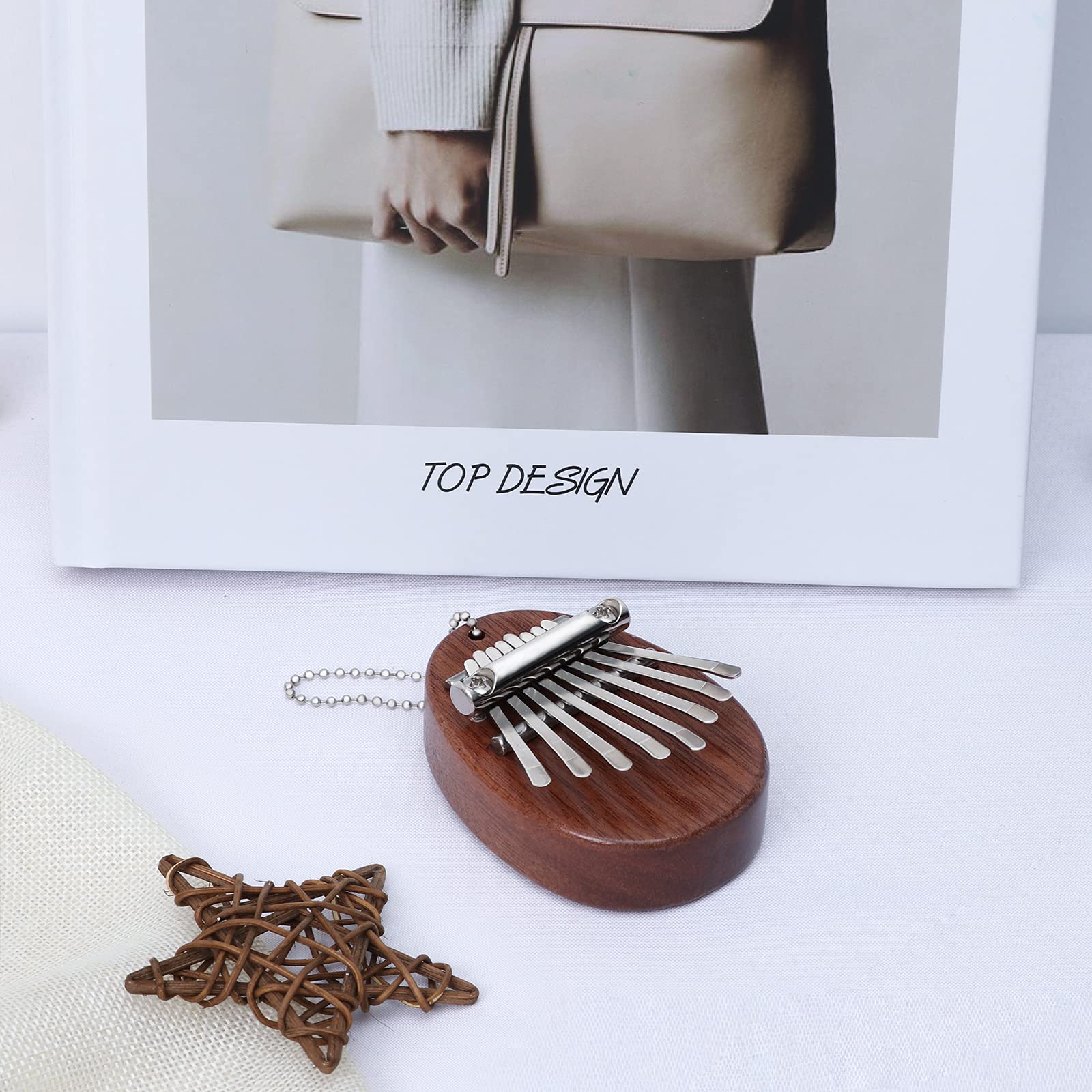 Deoukana 8 Key Mini Kalimba Exquisite Finger Thumb Piano Marimba Musical Accessory Pendant Gift for Kids, Adults and Beginners (Mini egg) (Sabilli-1)