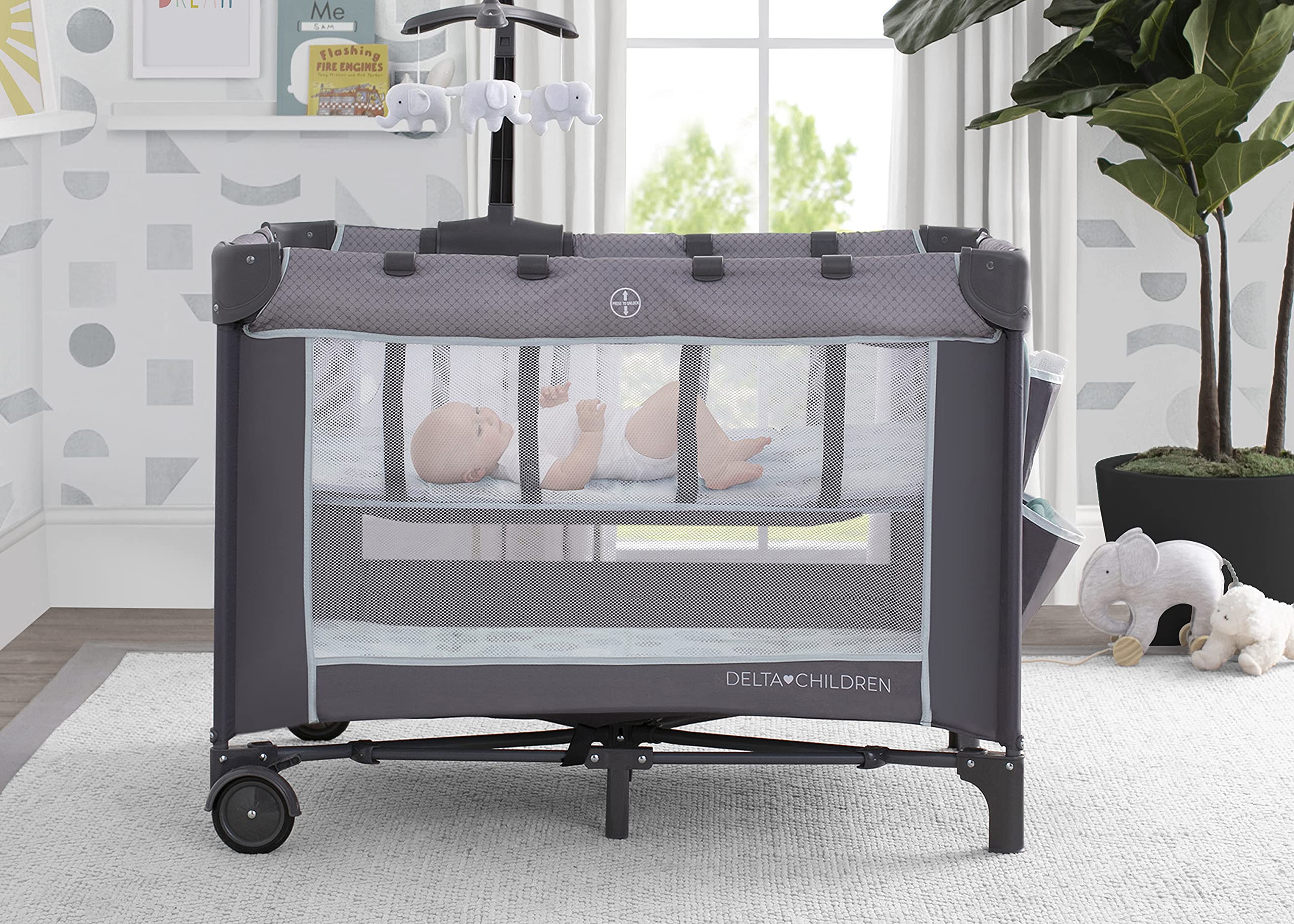 Delta Children LX Deluxe Portable Baby Play Yard with Removable Bassinet & Changing Table, Midnight