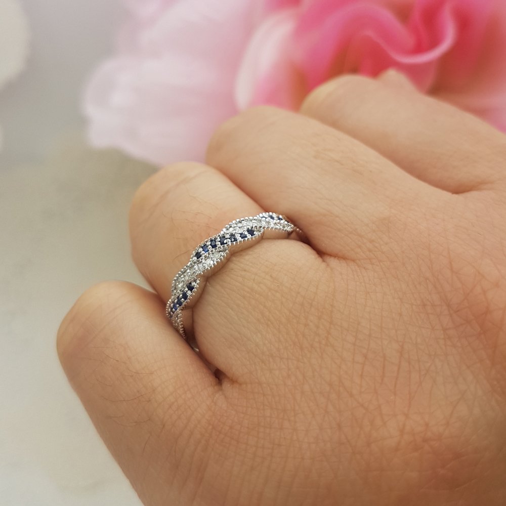 Dazzlingrock Collection 14K Round White Diamond & Blue Sapphire Ladies Anniversary Wedding Band Swirl Ring, White Gold, Size 5.5