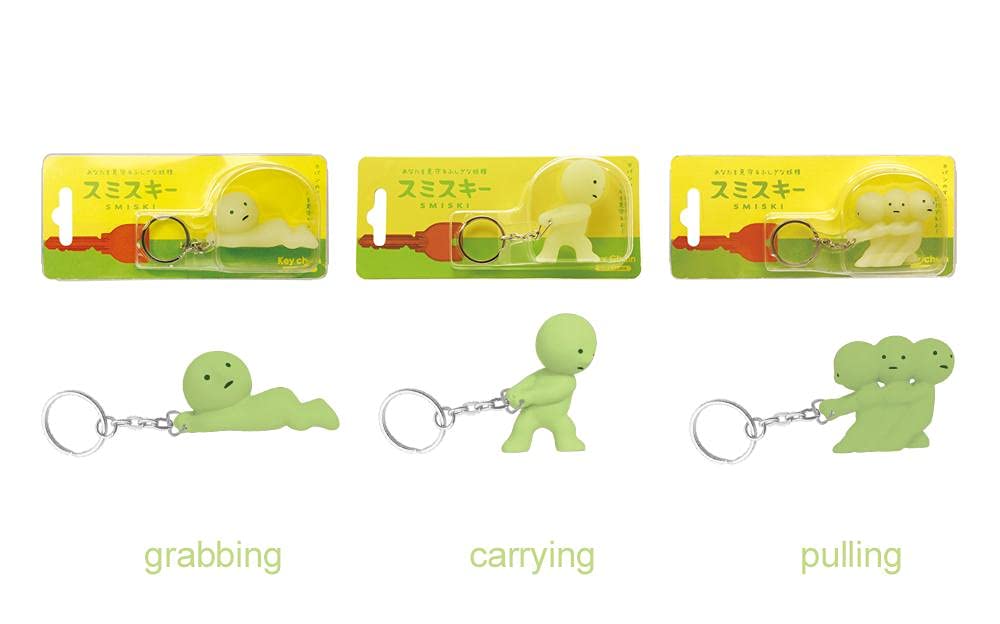 Dreams - Smiski Glow in The Dark Keychain - Grabbing