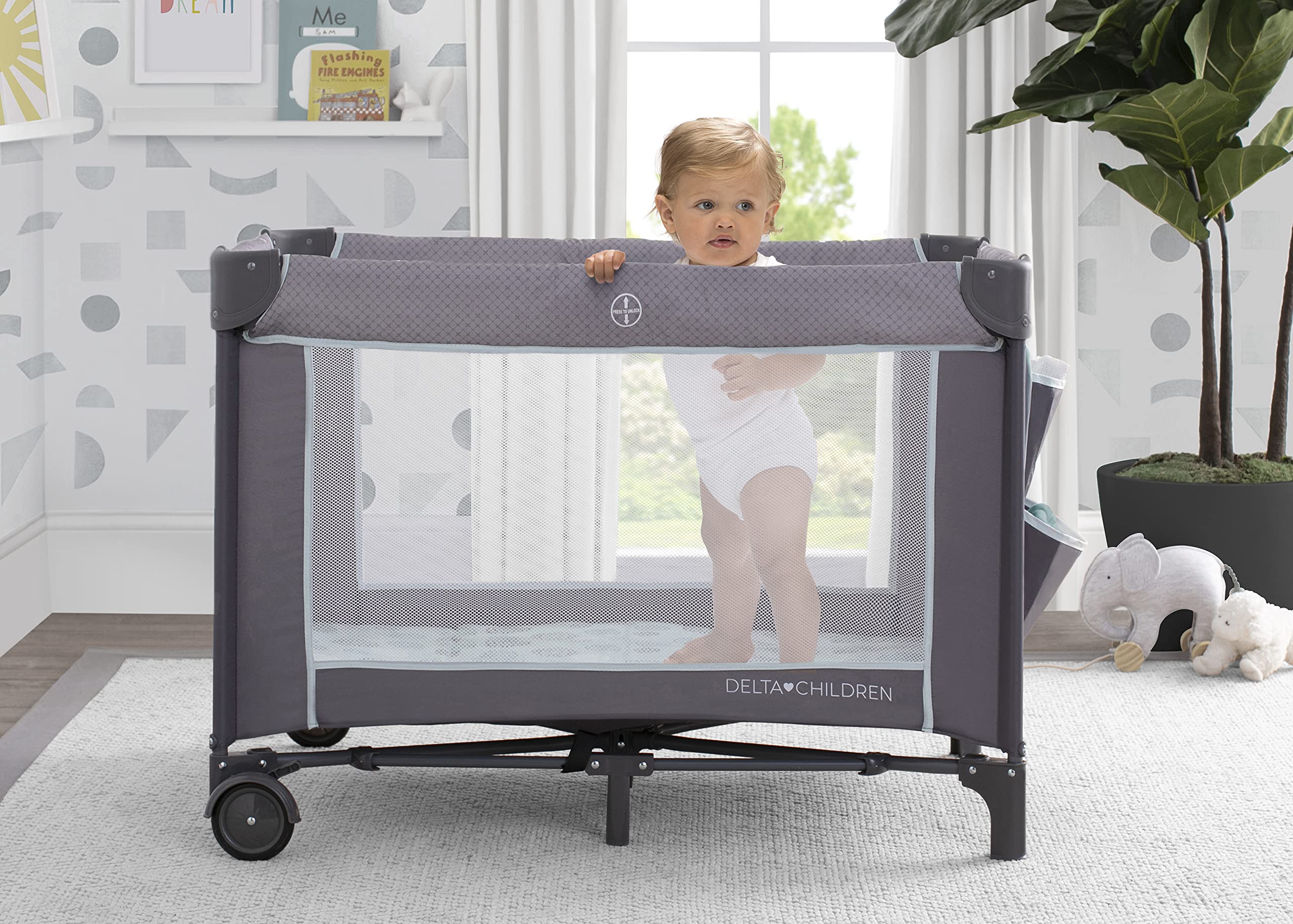 Delta Children LX Deluxe Portable Baby Play Yard with Removable Bassinet & Changing Table, Midnight