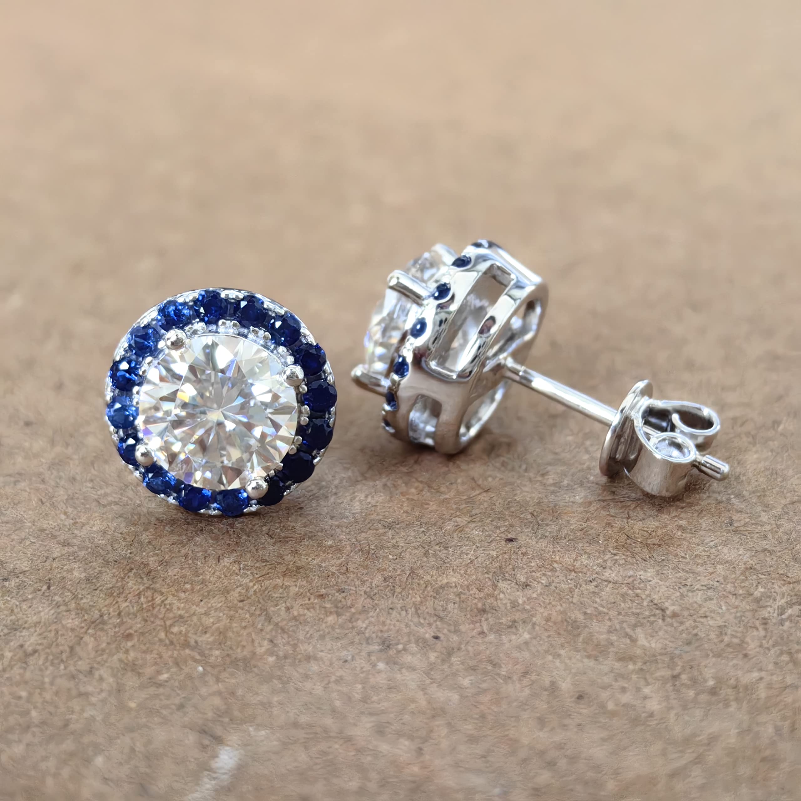 DovEggs Moissanite Stud Earrings for Women 10K White Gold Post 2ct GHI Cushion Cut Halo Created Moissanite with Blue Sapphire Push Back Earrings Sterling Silver (6.5mm Round -Cut)