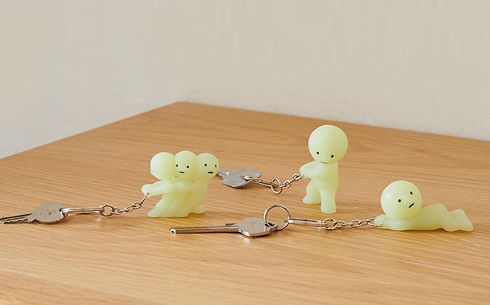 Dreams - Smiski Glow in The Dark Keychain - Grabbing