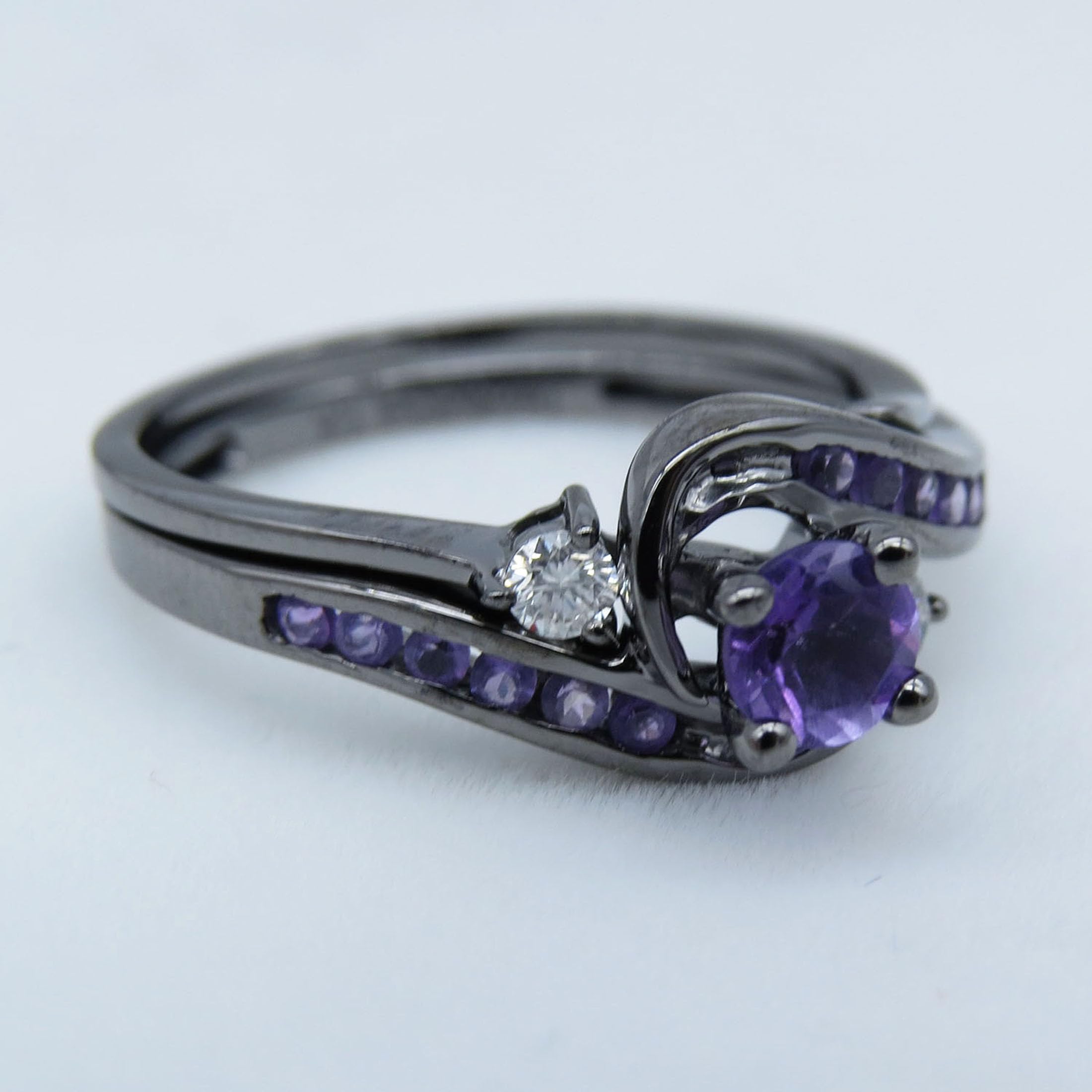 Dazzlingrock Collection Round Amethyst & White Diamond Swirl Bypass Wedding Ring Set for Women Black Plated in 10K White Gold, Size 8