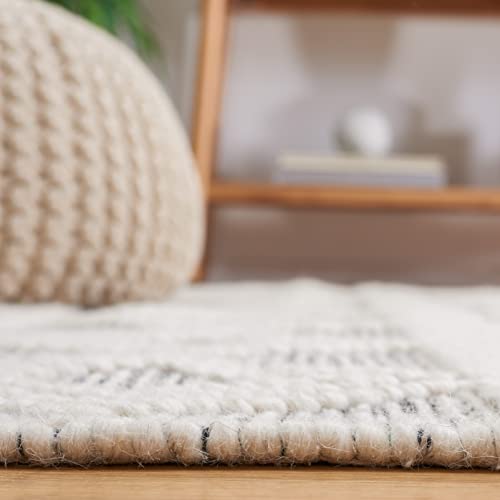 Safavieh Natura Collection Accent Rug - 4' x 6', Ivory & Black, Handmade Flat Weave Moroccan Boho Rustic Braided Tassel Wool, Ideal for High Traffic Areas in Entryway, Living Room, Bedroom (NAT307A)