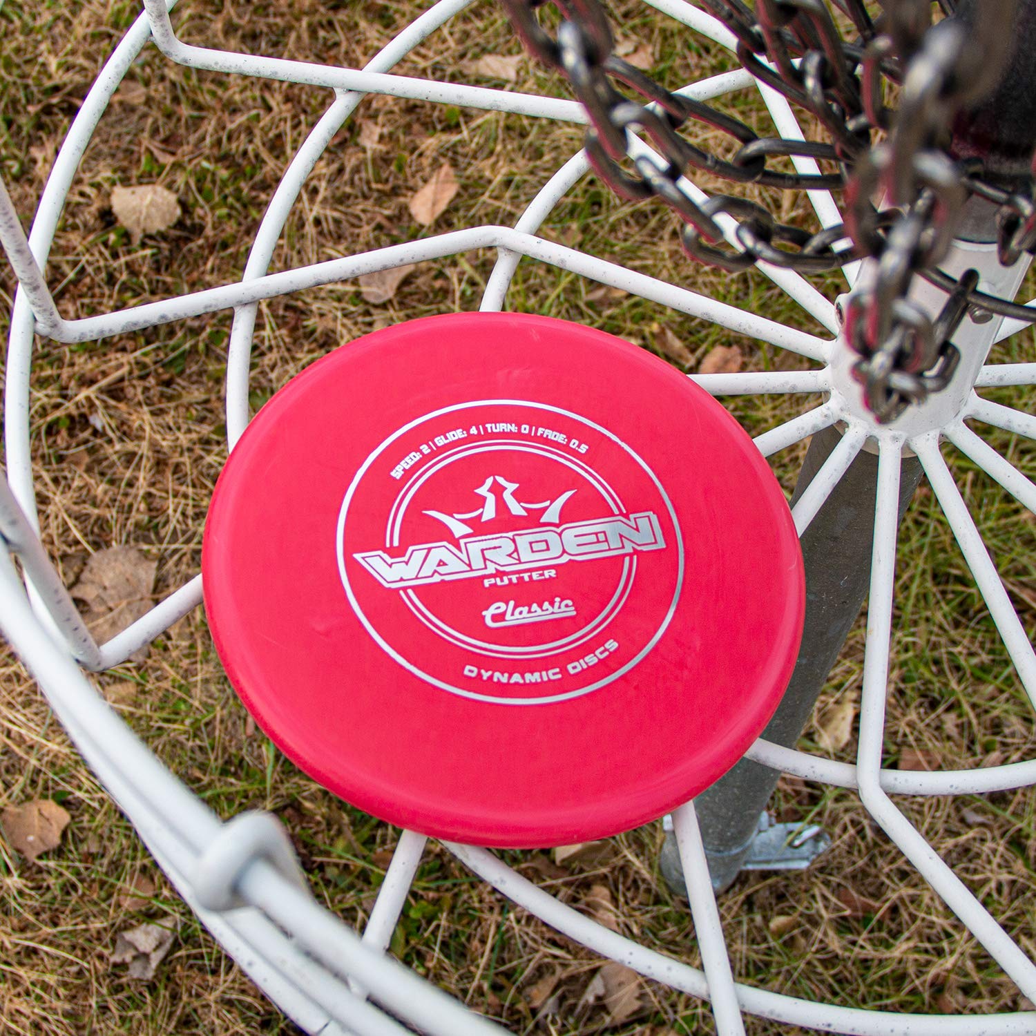 Dynamic Discs Classic Warden Disc Golf Putter | 170g Plus | Throwing Frisbee Golf Putter | Smooth Release and Neutral Flight | Straight Flying Disc Golf Putter | Stamp Color Will Vary (Red)