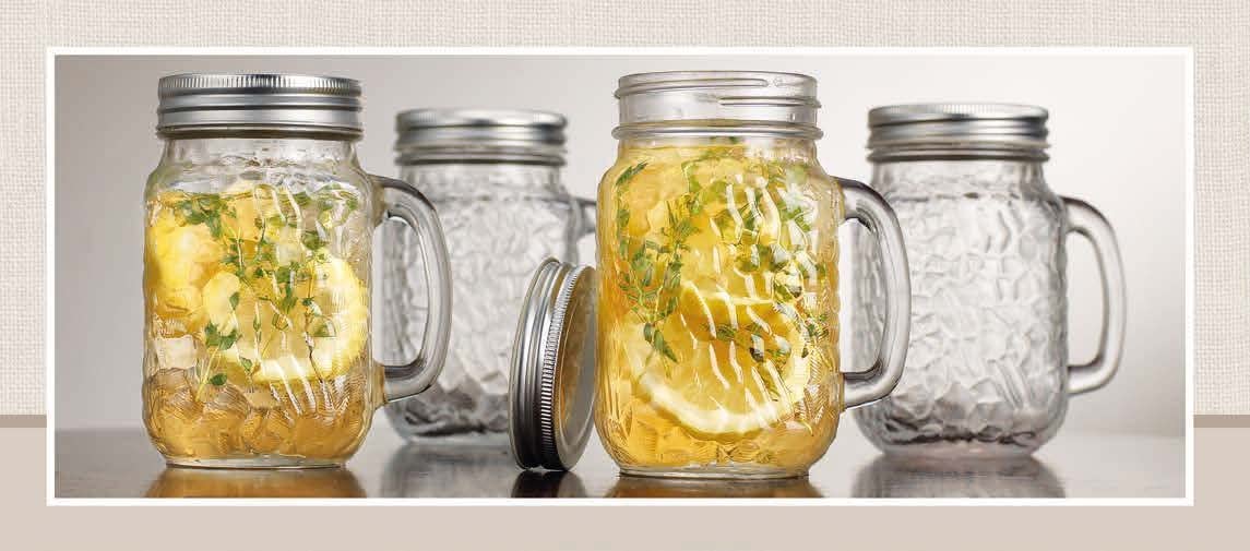 Glaver's Mason Jar Cups 16Oz β Set of 4 Mason Jars with Lids and Handles β Hammered Style Large Mason Cups for Parties, Dinner, Home, Lemonade, Smoothies, Cocktails, Drinks - Dishwasher Safe.
