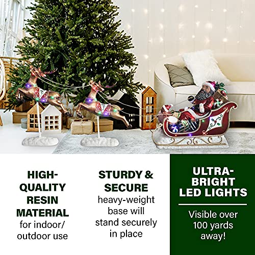 Fraser Hill Farm Flying Reindeer and African American Santa in Sleigh Figurine | Christmas Statue Includes Built-in LED Lights | Great Holiday Decoration | FFRS000-SC1-RDAA, Red