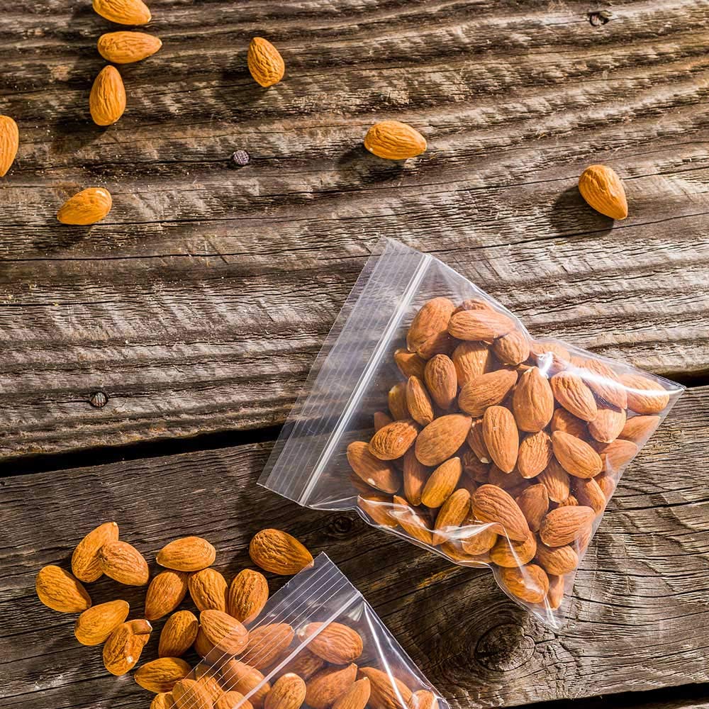 Restaurantware Bag Tek 4.5 x 4 Inch Resealable Zip Bags 100 High Clarity Zip Bags - For Snacks Nuts Seeds Candy Treats & More Clear Plastic Zipper Storage Bags