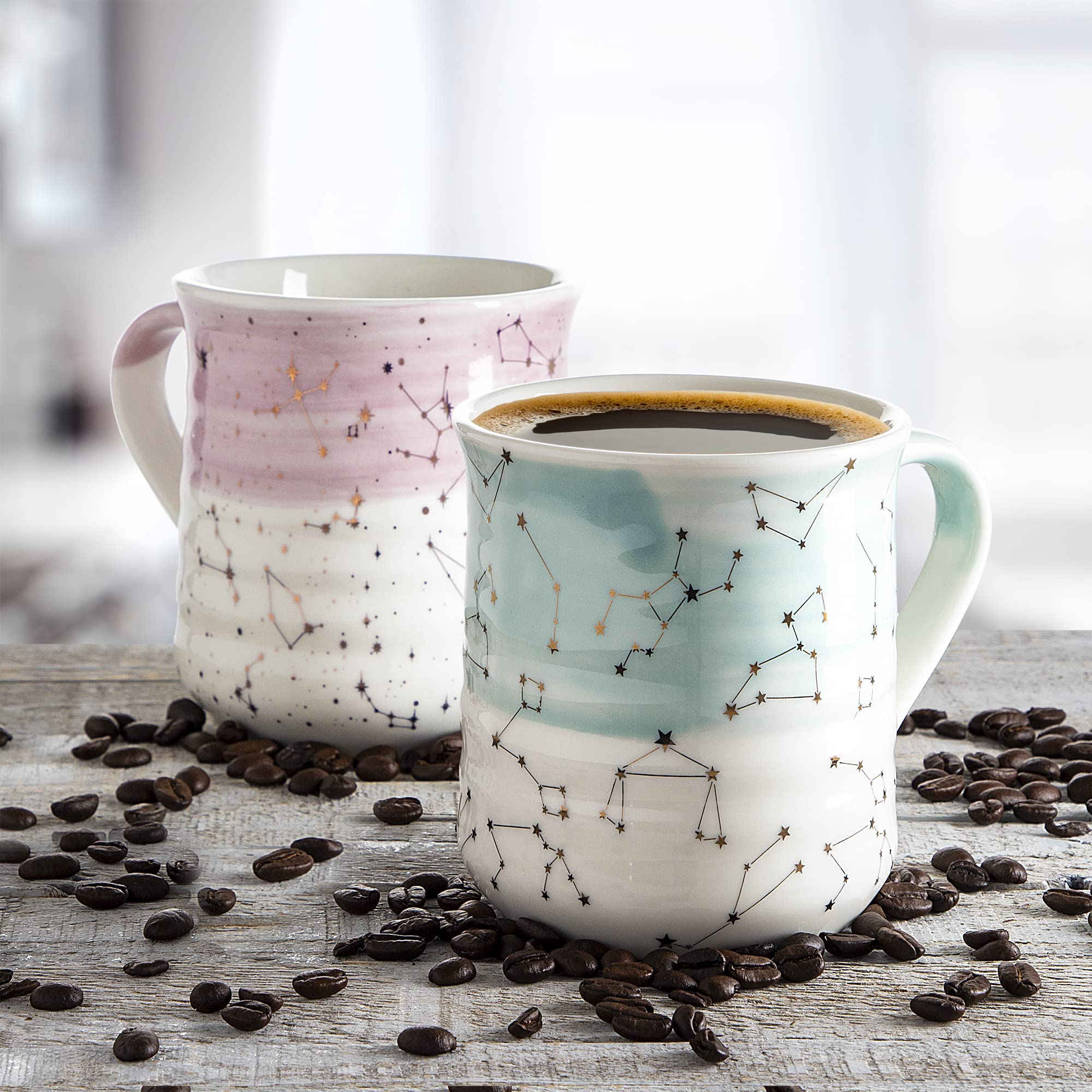 Dwell Studio Set of 2 Stoneware Coffee Mugs- Astrology Sign, Constellation Coffee Cups, Mugs for Tea, Latte, and Hot Chocolate, 17 oz (Light Blue and Pink)