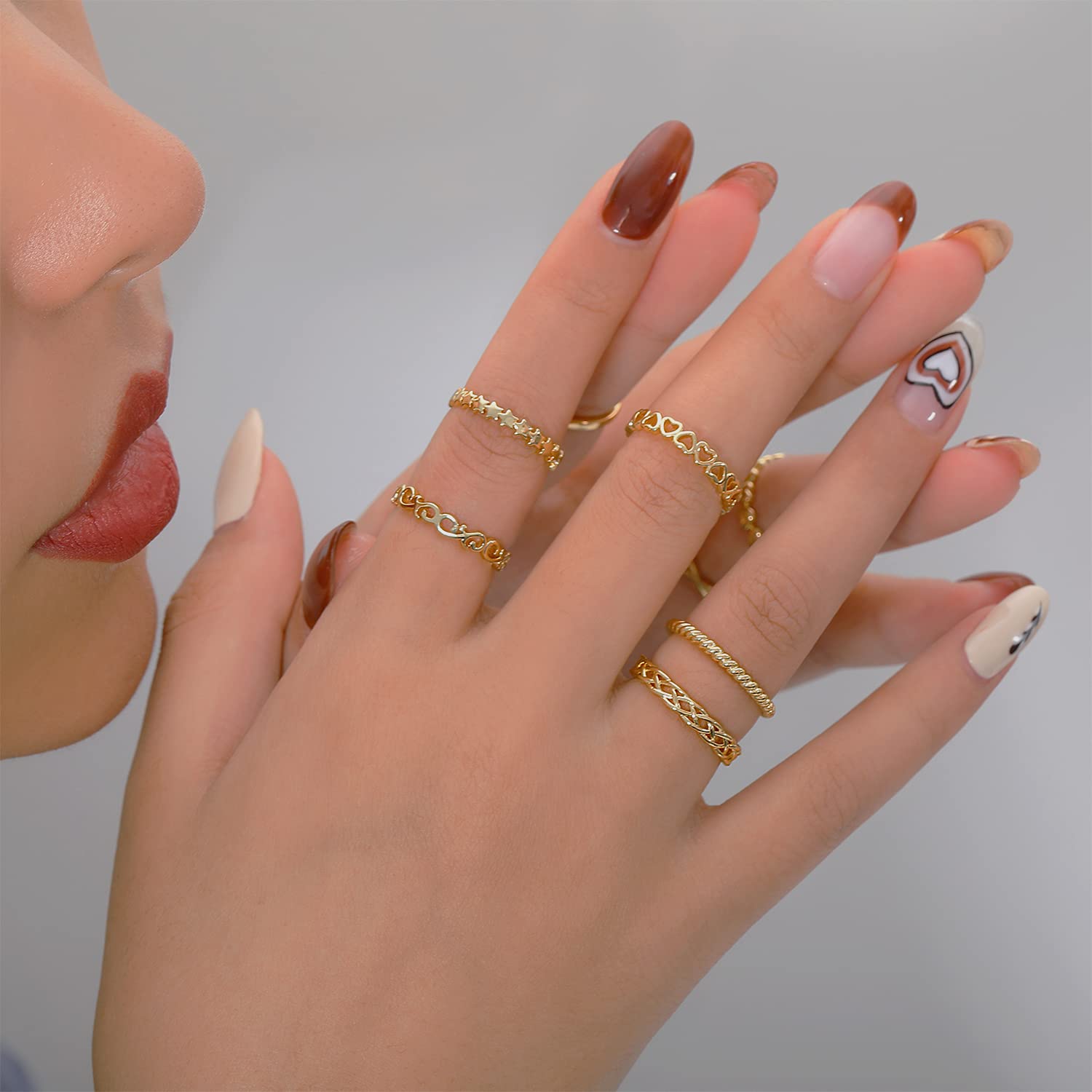 FUNEIA 8Pcs Knuckle Stacking Rings for Women14K Gold Plated Stackable Thumb Rings Set Star Heart Celtic Knot Daisy Flower Twisted Eternity Rings Engagement Promise Wedding Band Ring Size 5-9